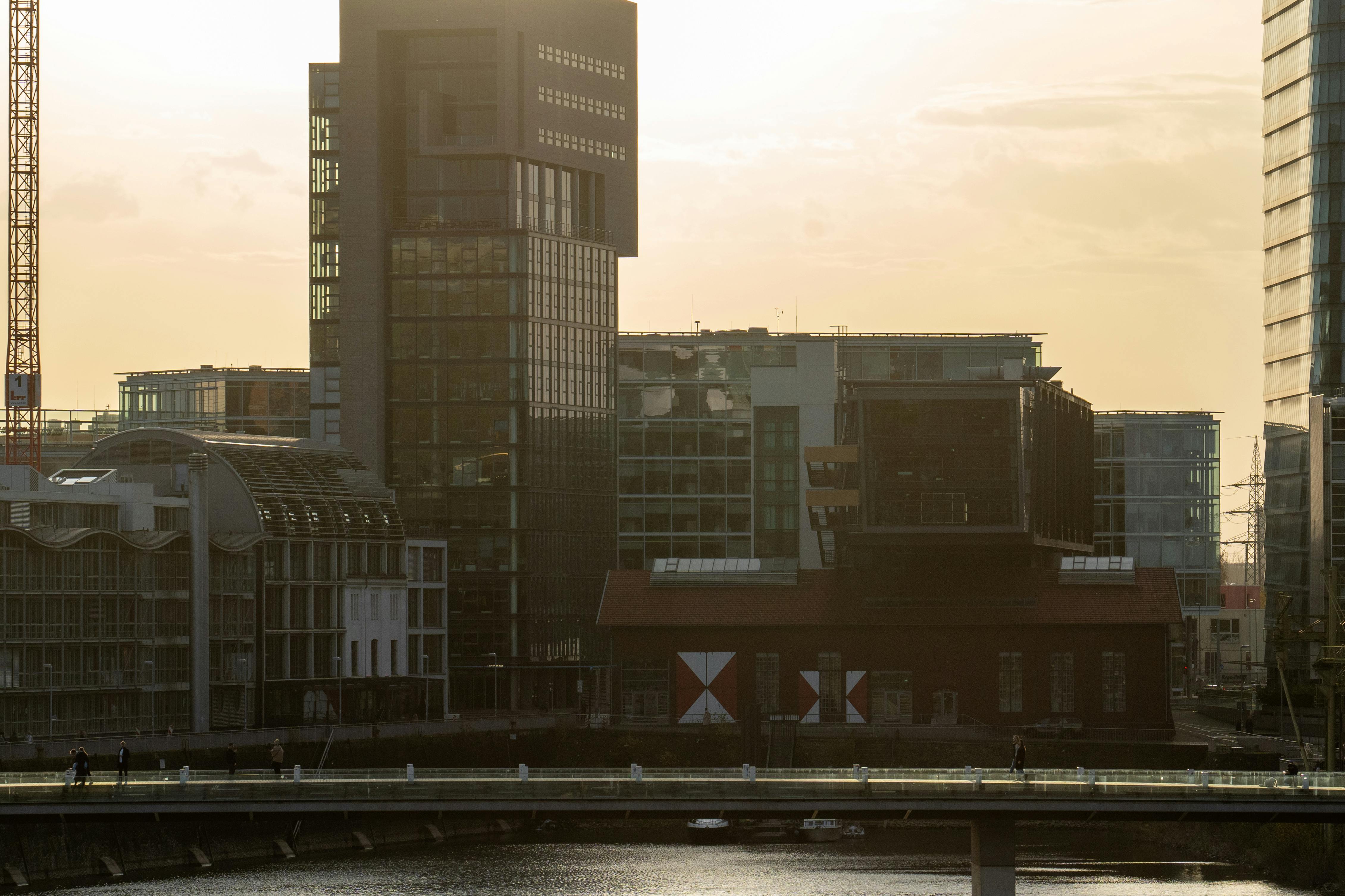 Modern Urban Skyline at Sunset · Free Stock Photo