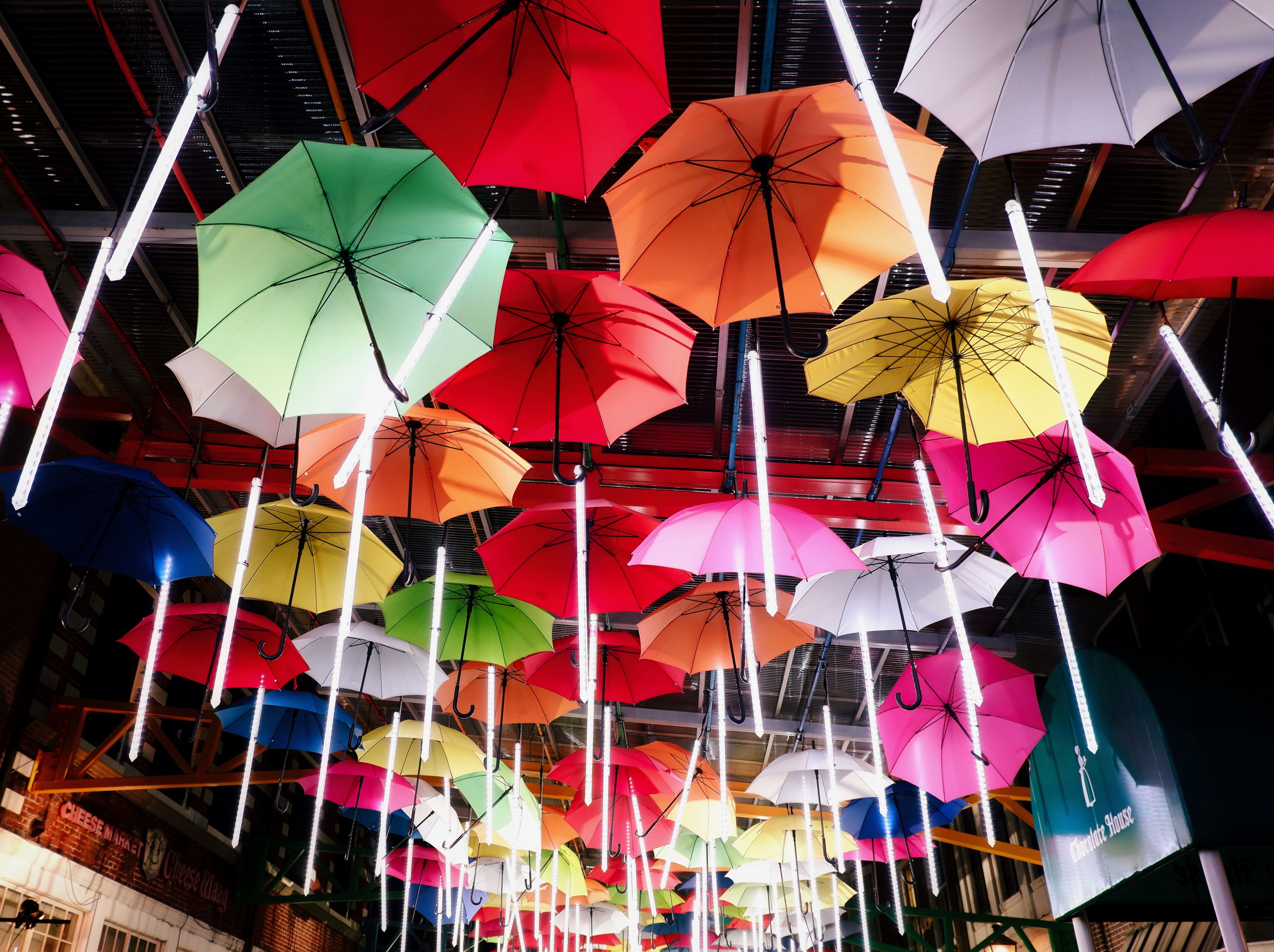 Vibrant Umbrella Installation in Urban Setting · Free Stock Photo