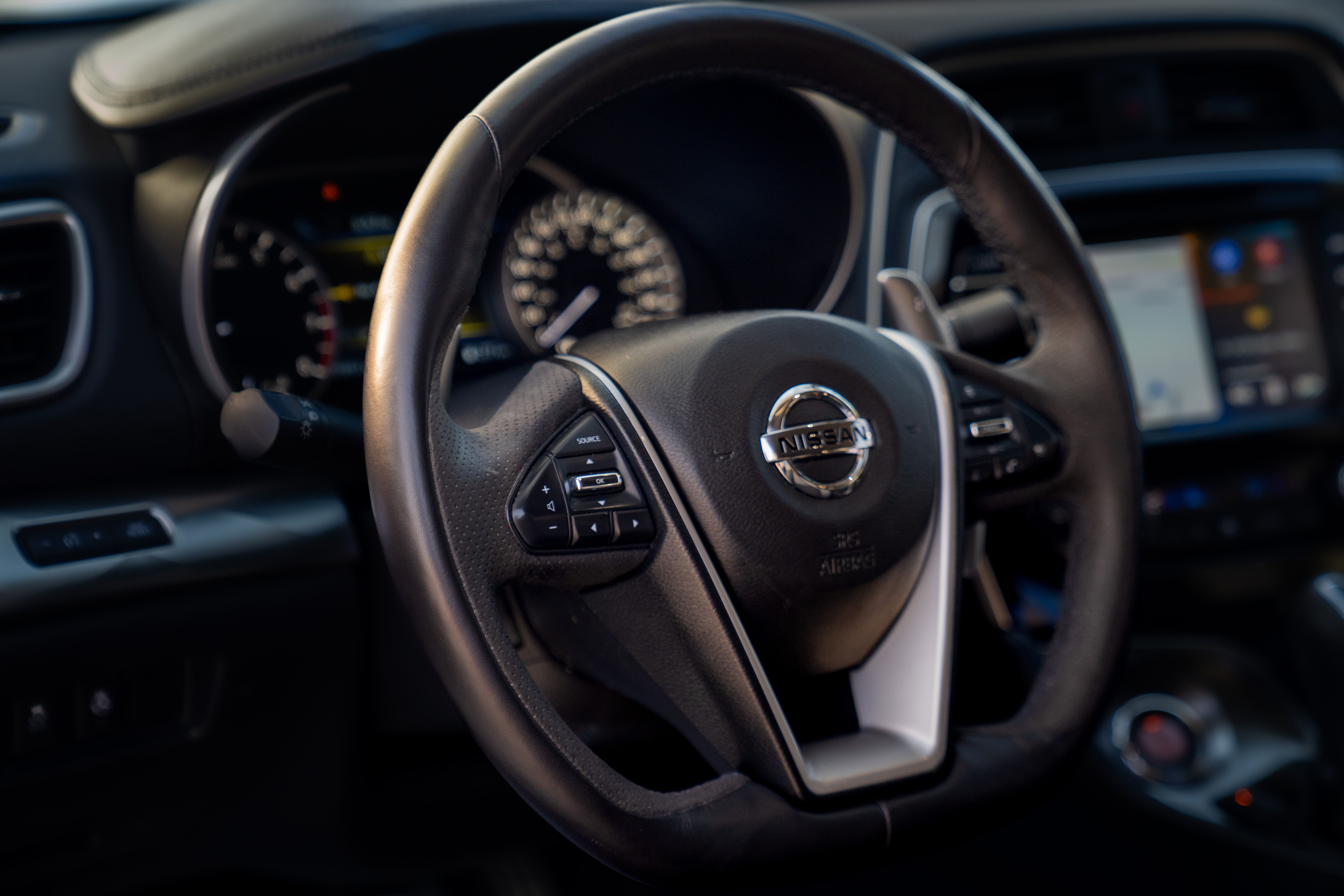 Close-Up of Car Steering Wheel in Modern Vehicle · Free Stock Photo