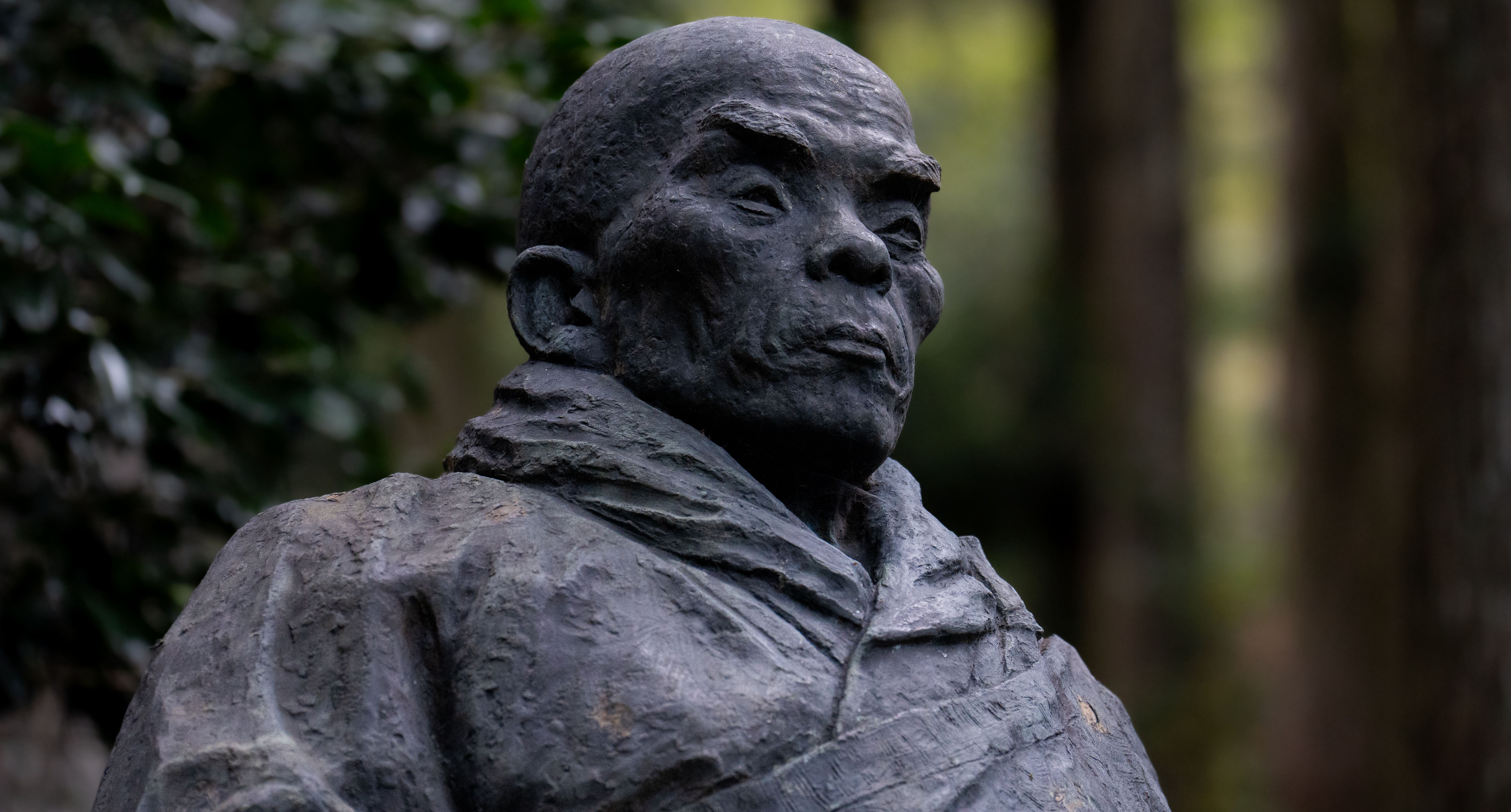 Historic Japanese Monk Statue in Serene Forest · Free Stock Photo