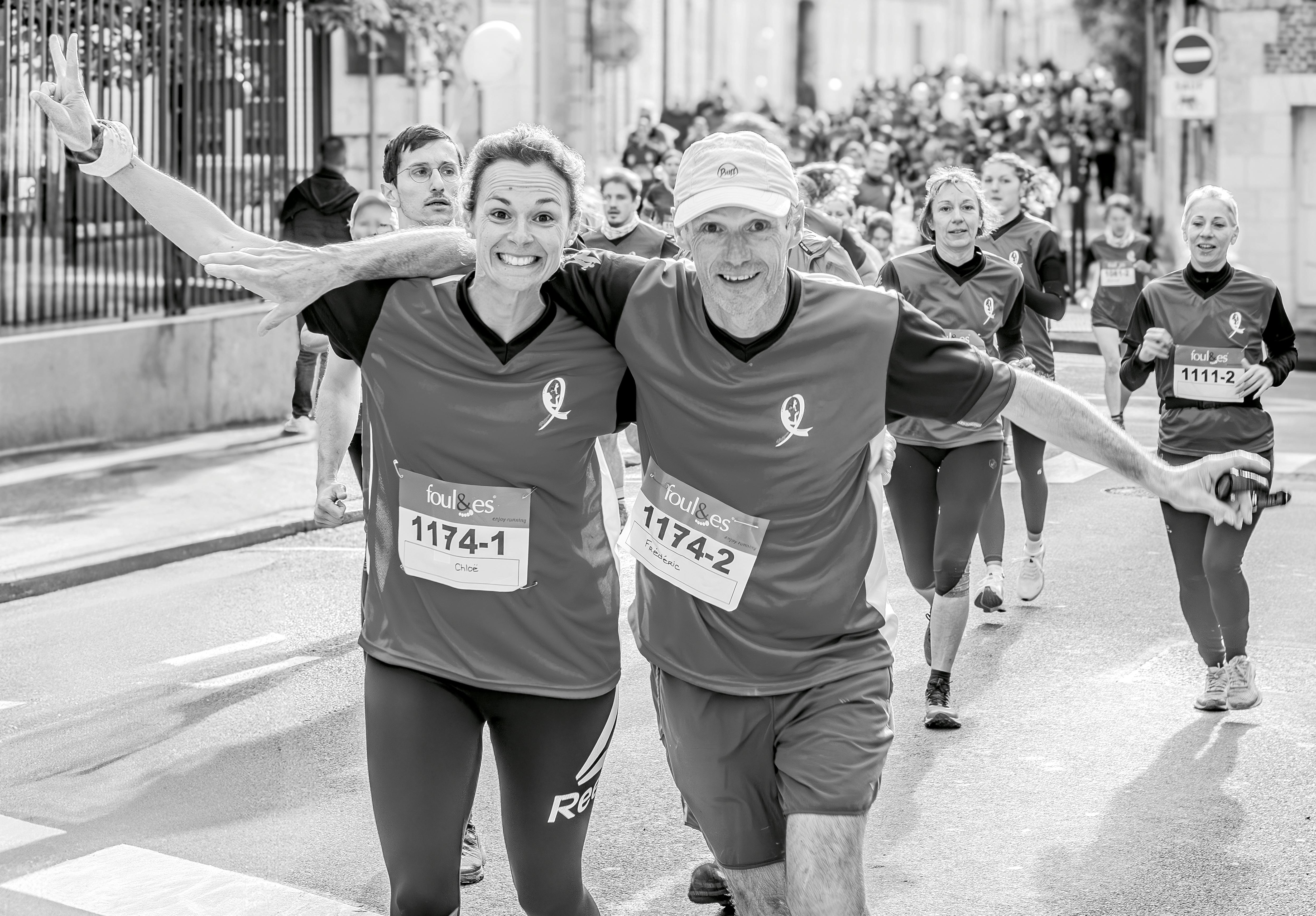 Joyful Marathon Runners Celebrating Victory · Free Stock Photo