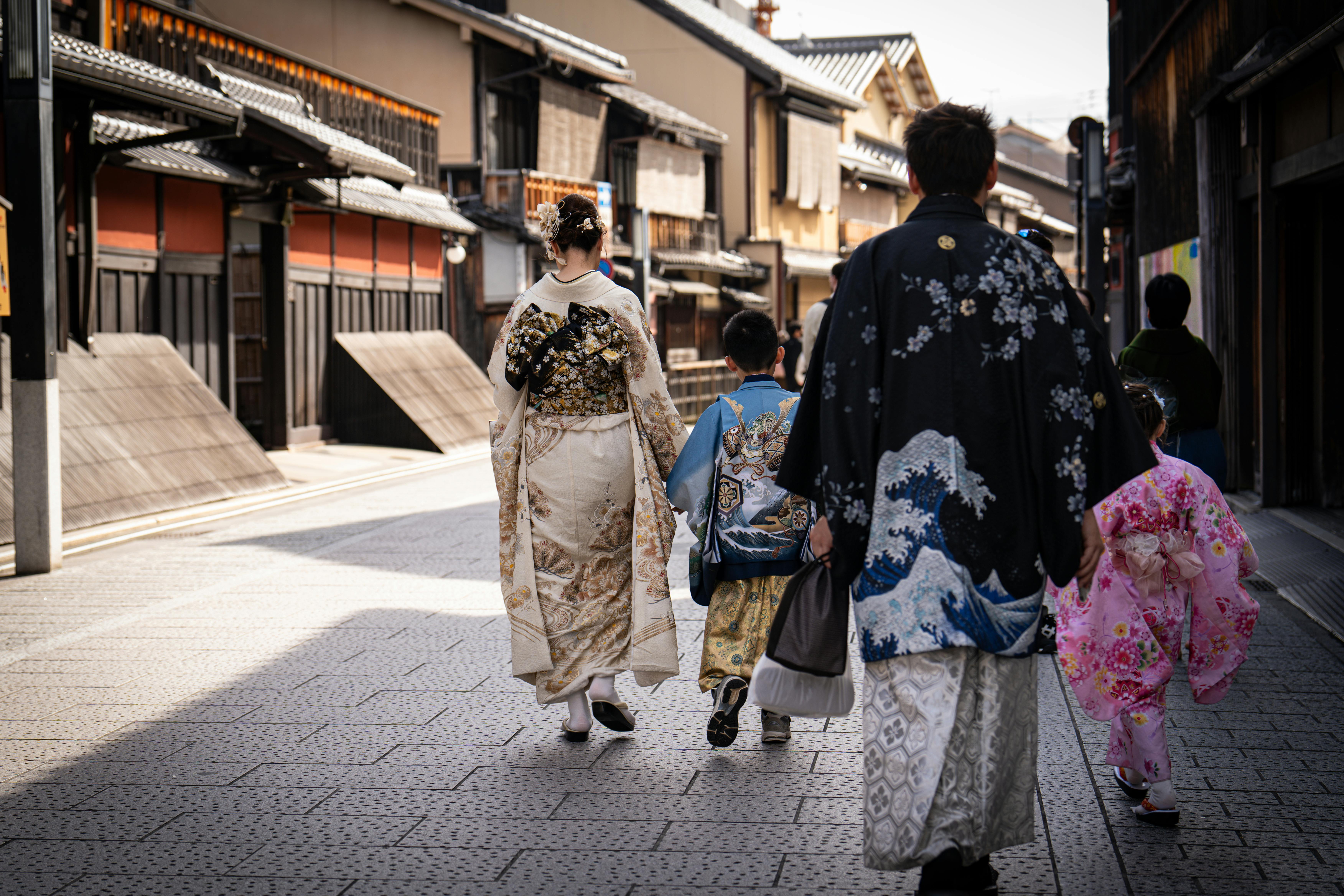 Traditional Japanese Family in Historic Kyoto Street · Free Stock Photo