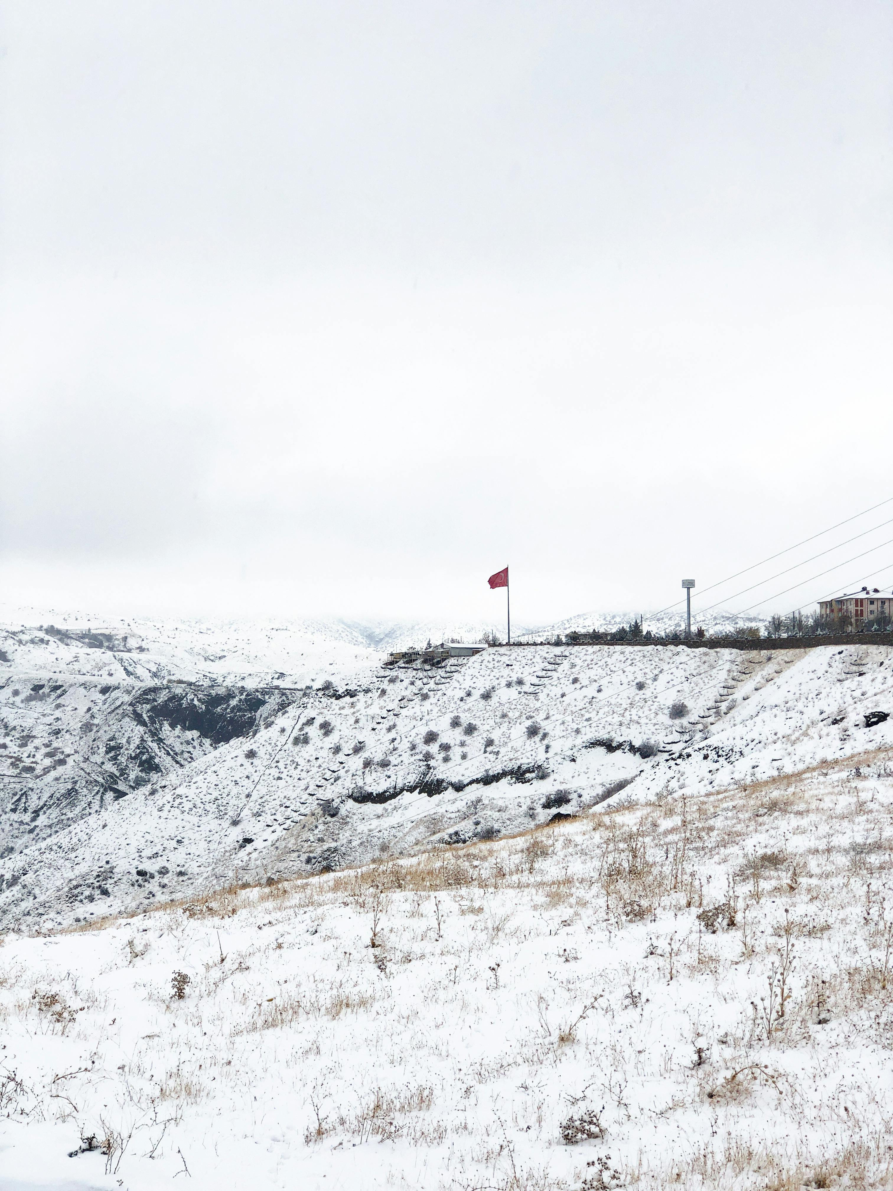 Snowy Landscape in Palu, Elazığ with Turkish Flag · Free Stock Photo
