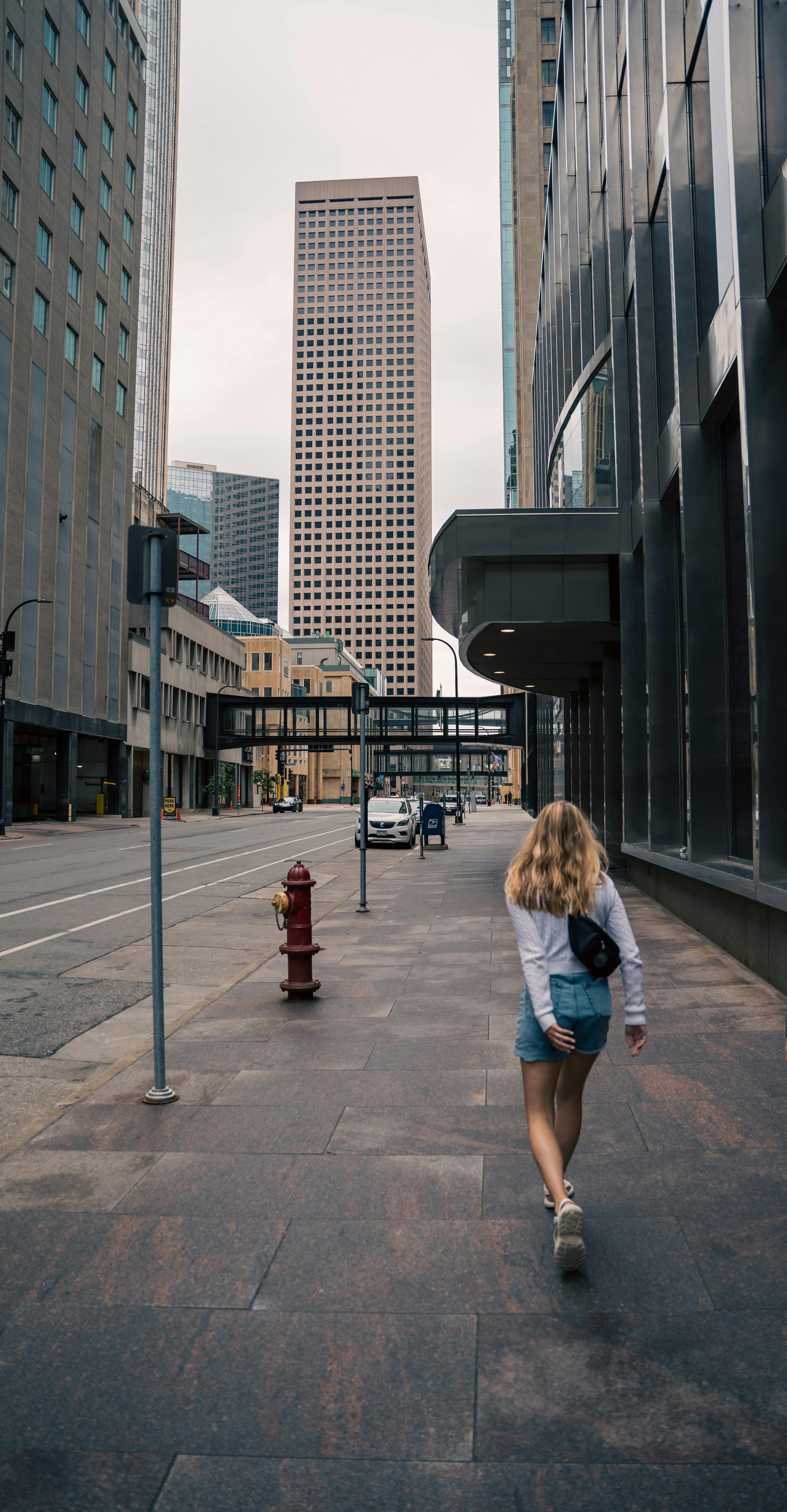 Cityscape Walkway with Modern Skyscrapers · Free Stock Photo