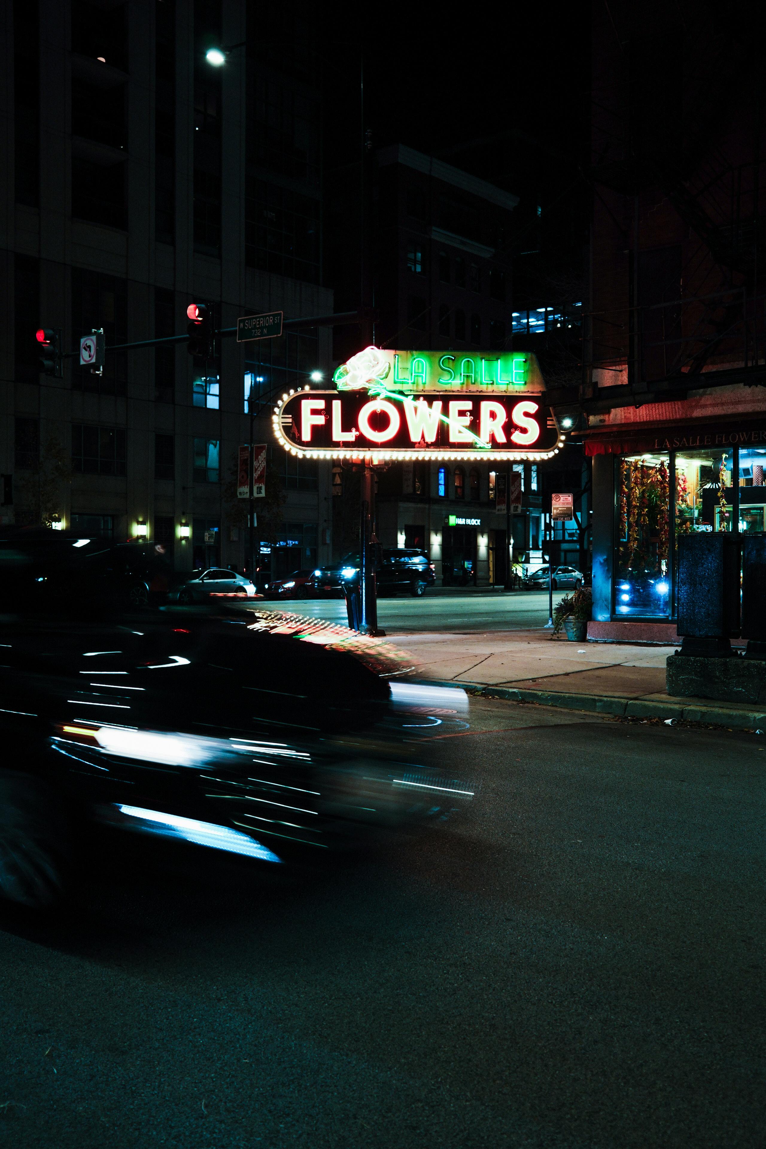 Neon Flower Shop Sign at Night in Chicago · Free Stock Photo