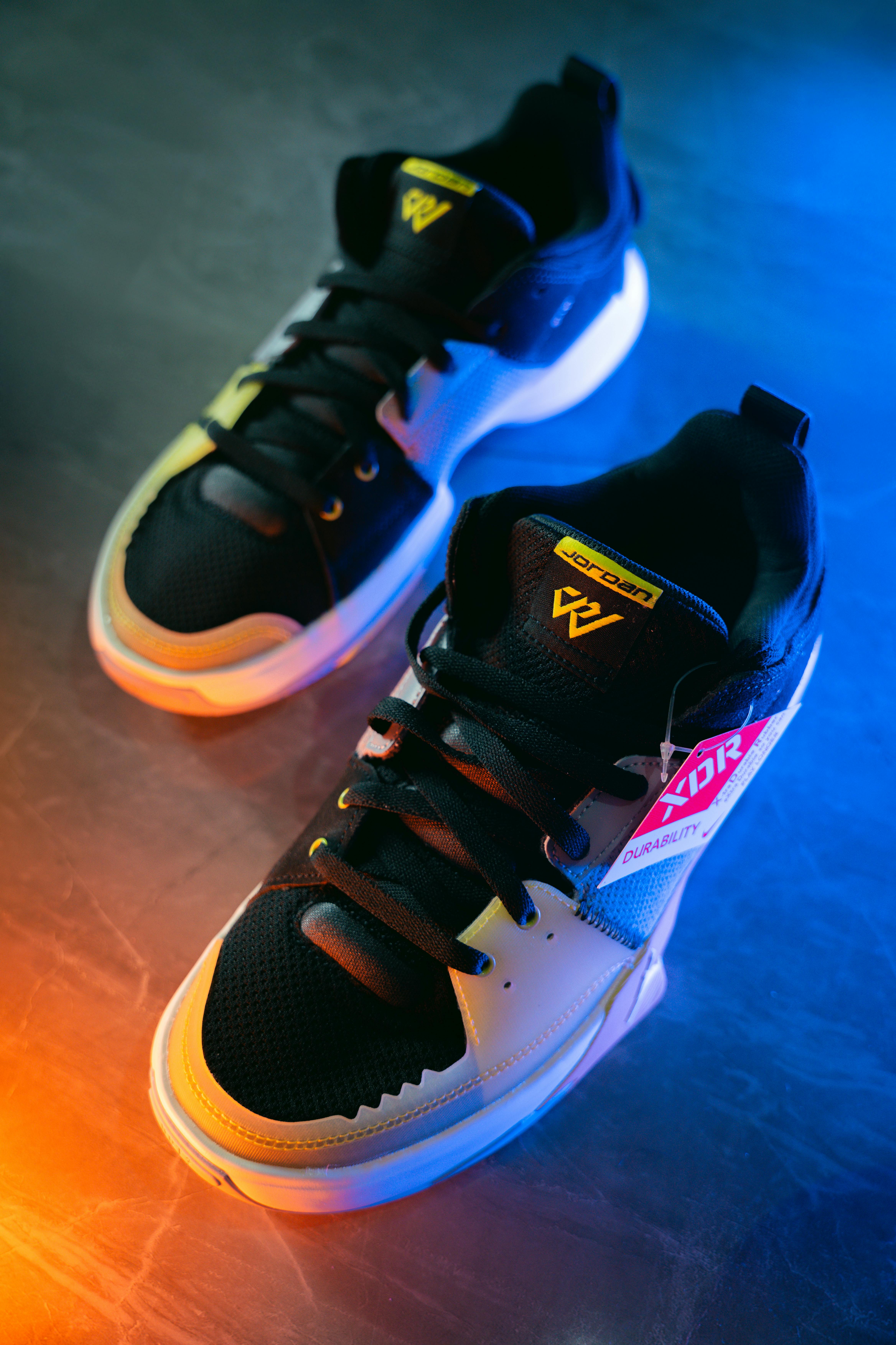 Stylish Sports Sneakers with Colorful Lighting · Free Stock Photo