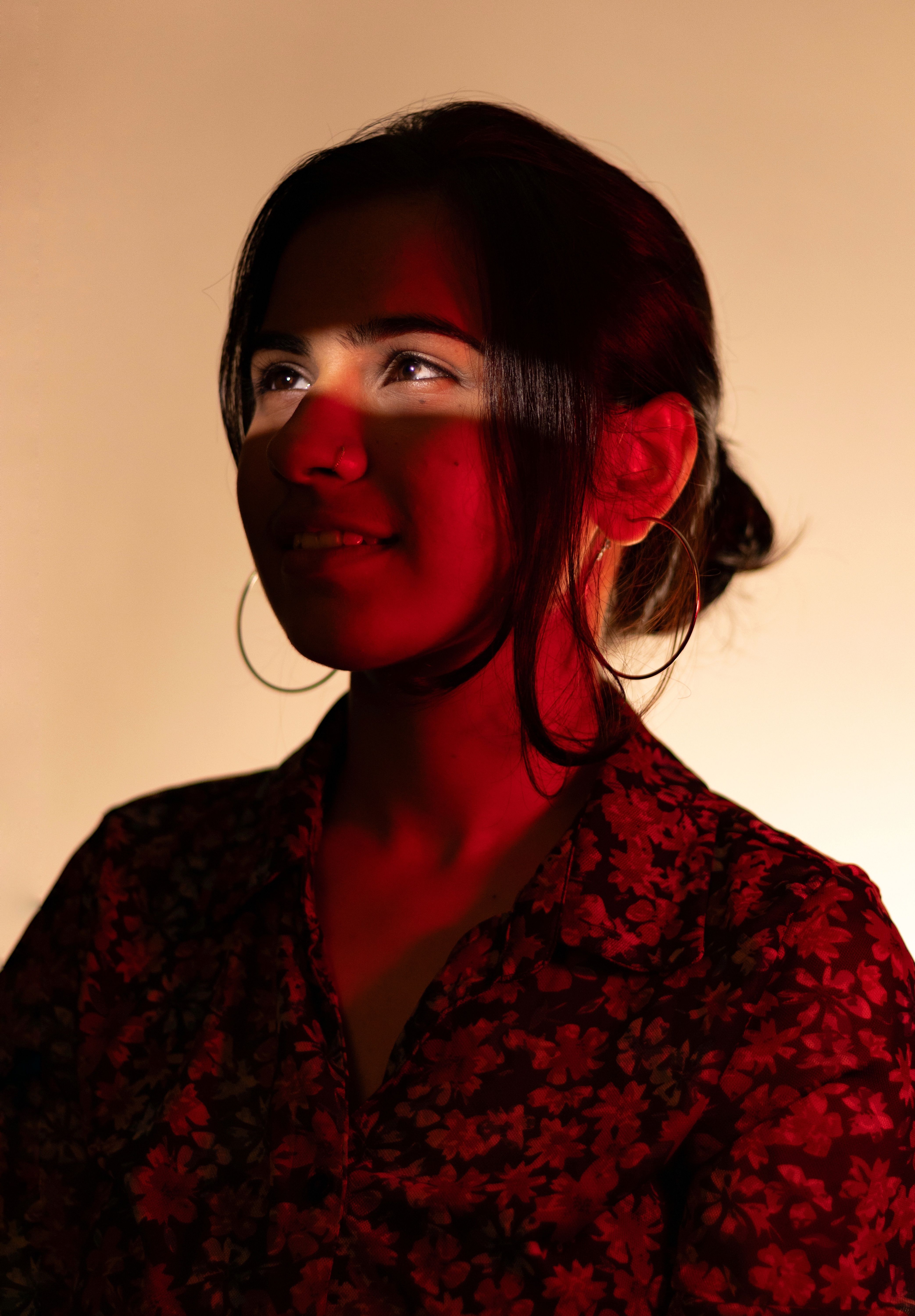 Portrait of Woman with Dramatic Red Lighting · Free Stock Photo