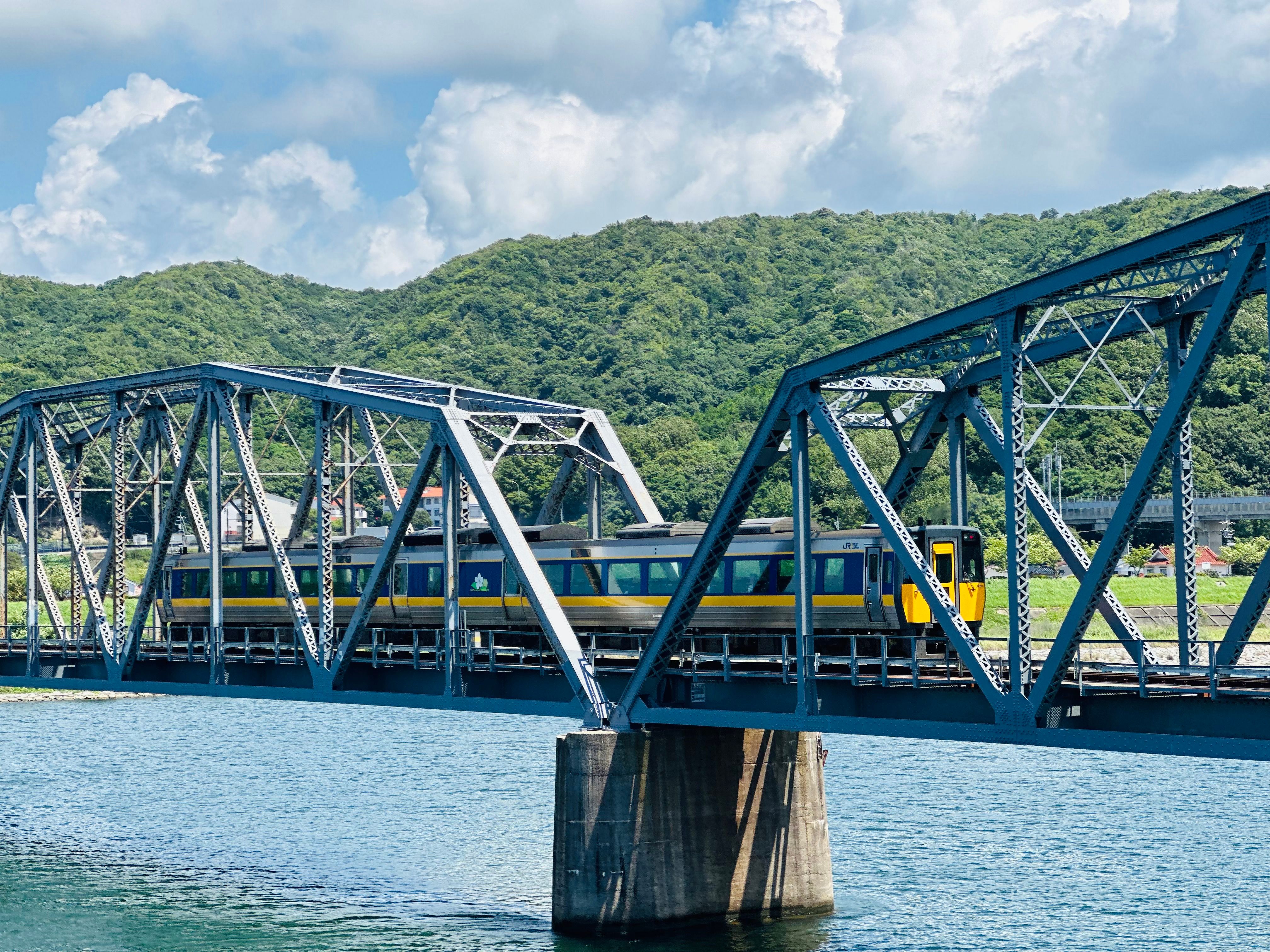 Train Crossing Steel Bridge Over River · Free Stock Photo