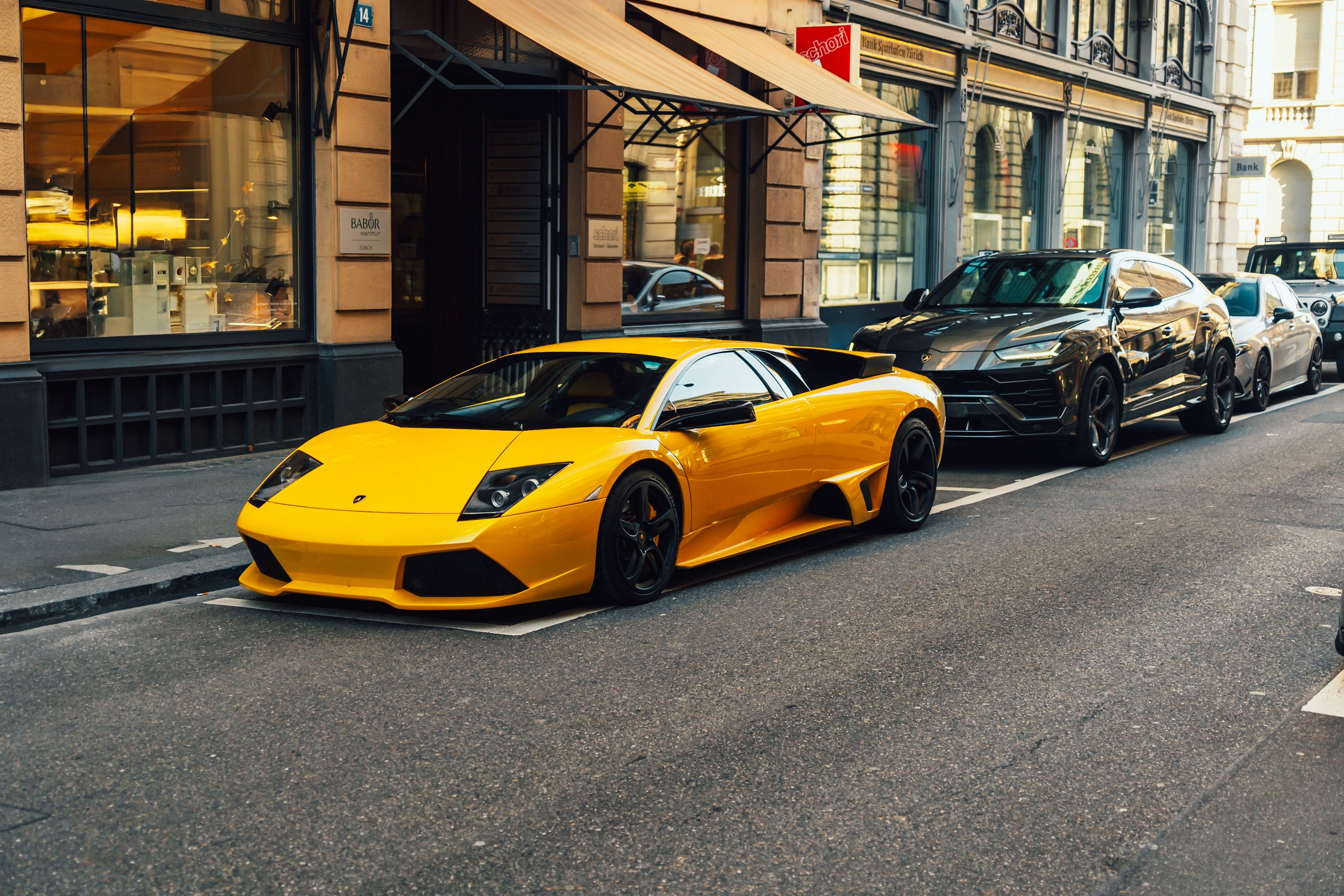 Yellow Lamborghini Parked on Urban Street · Free Stock Photo
