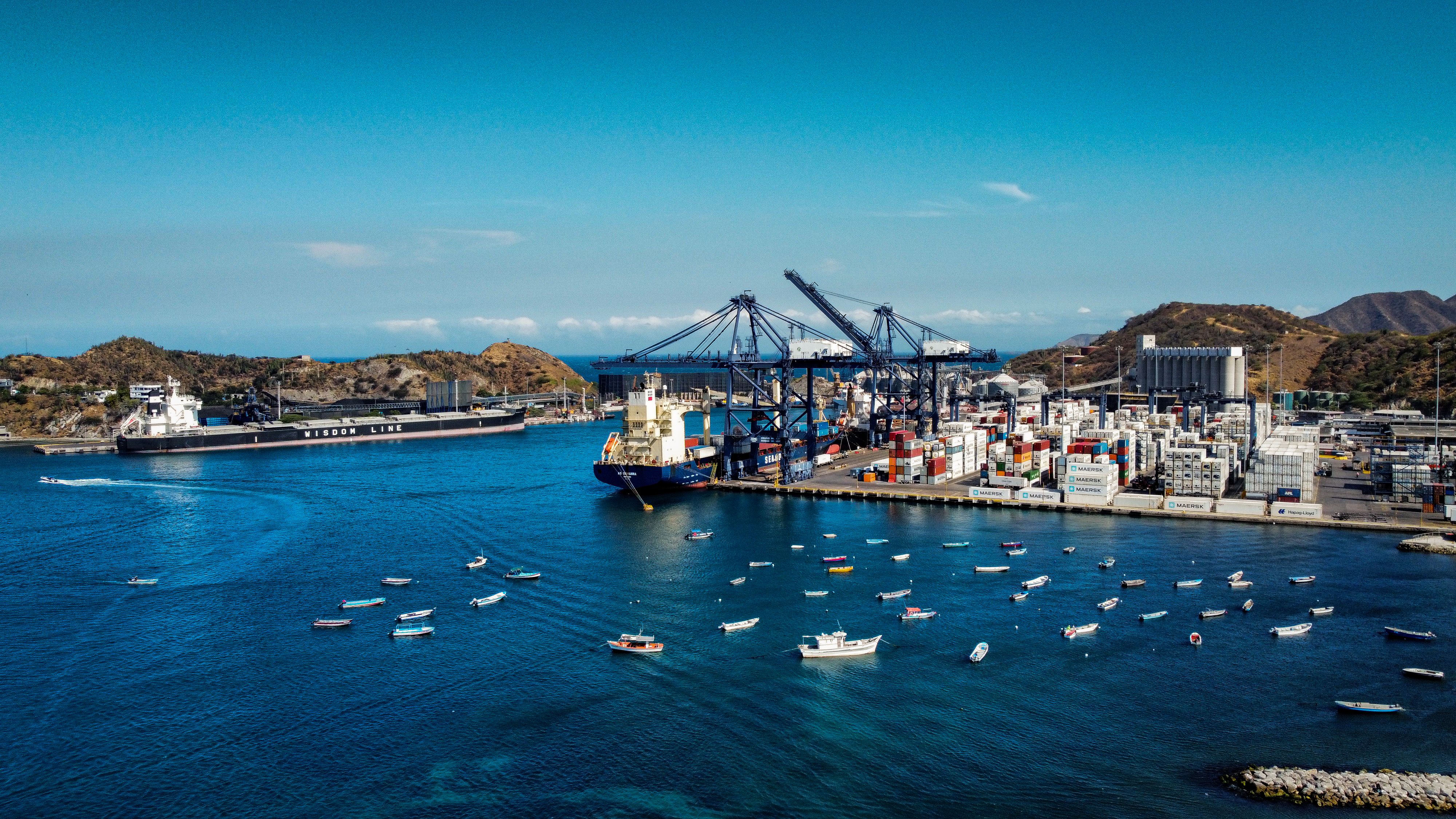 Aerial View of Vibrant Port with Cargo Ships · Free Stock Photo