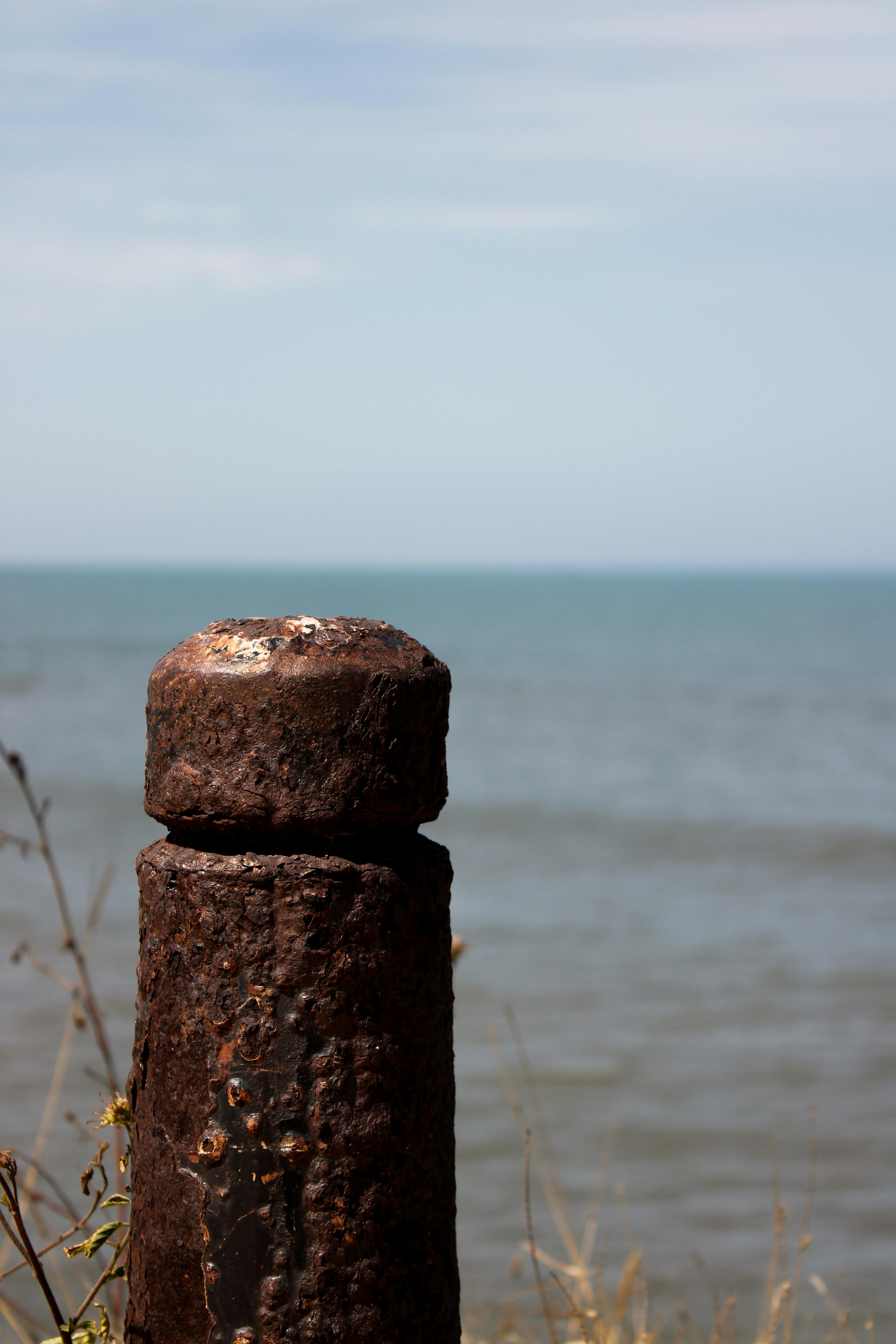 Rusted Metal Post by the Seaside · Free Stock Photo