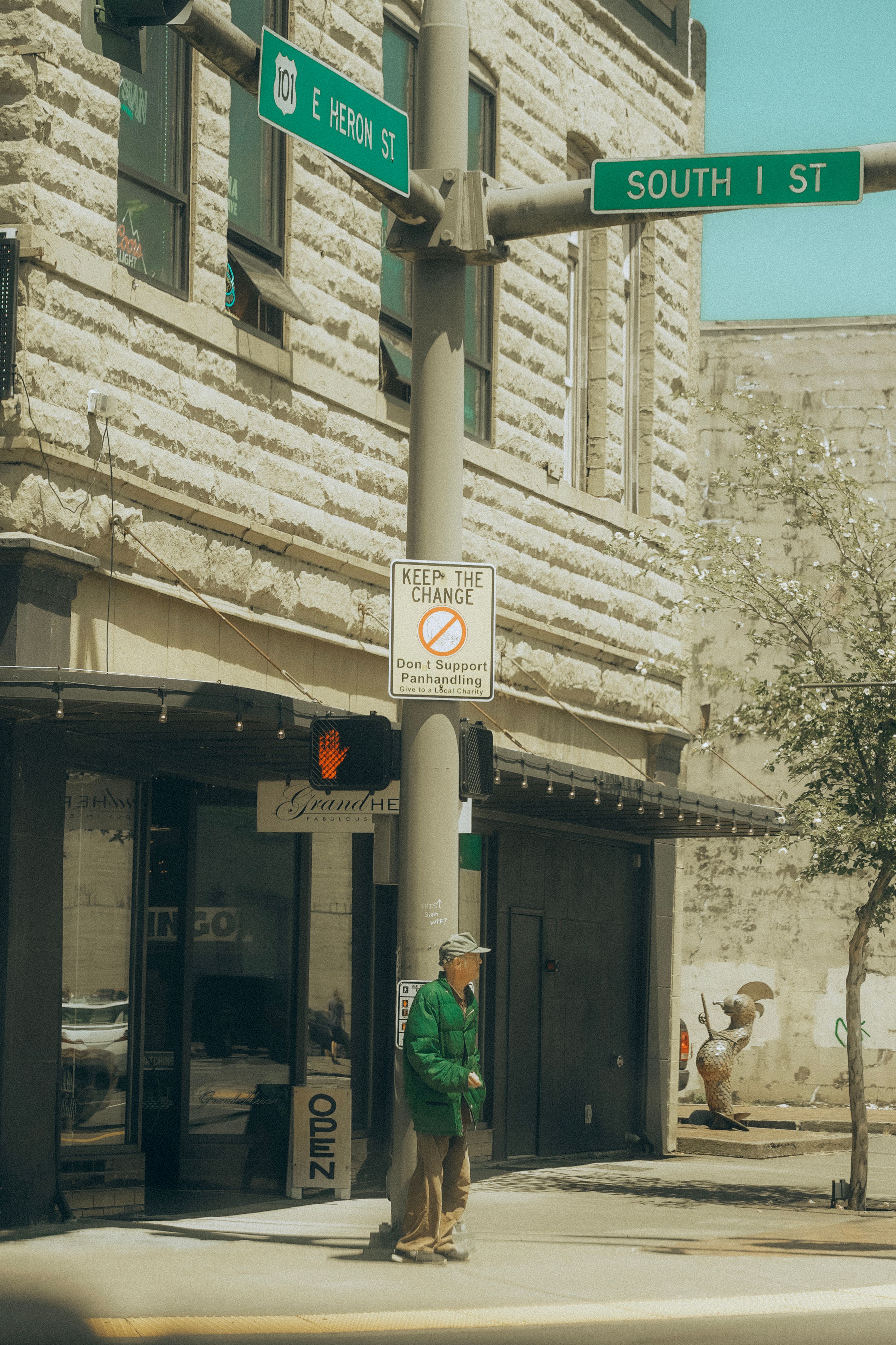 City Corner with Vintage Street Signs · Free Stock Photo