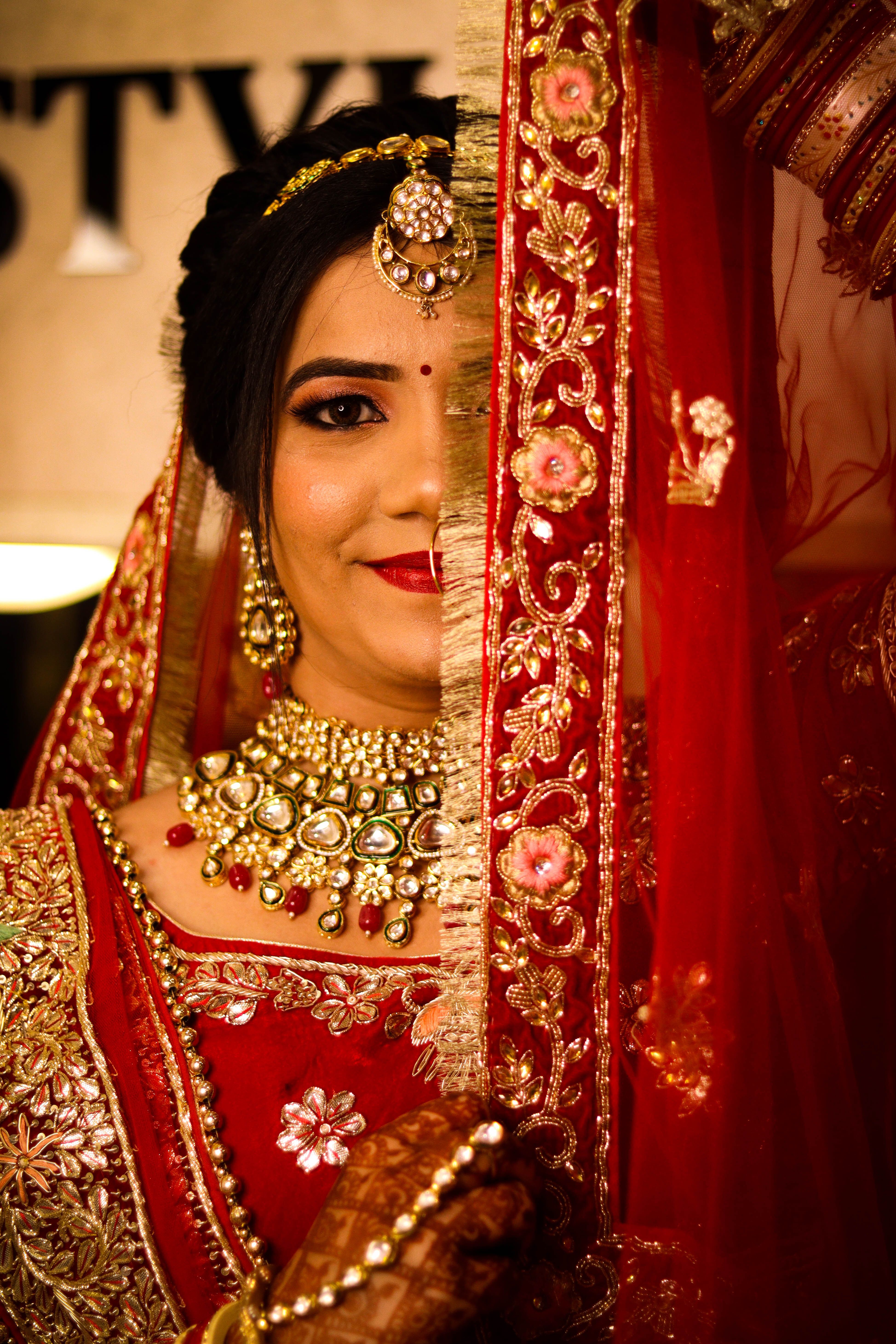 Stunning Indian Bride in Traditional Red Saree · Free Stock Photo