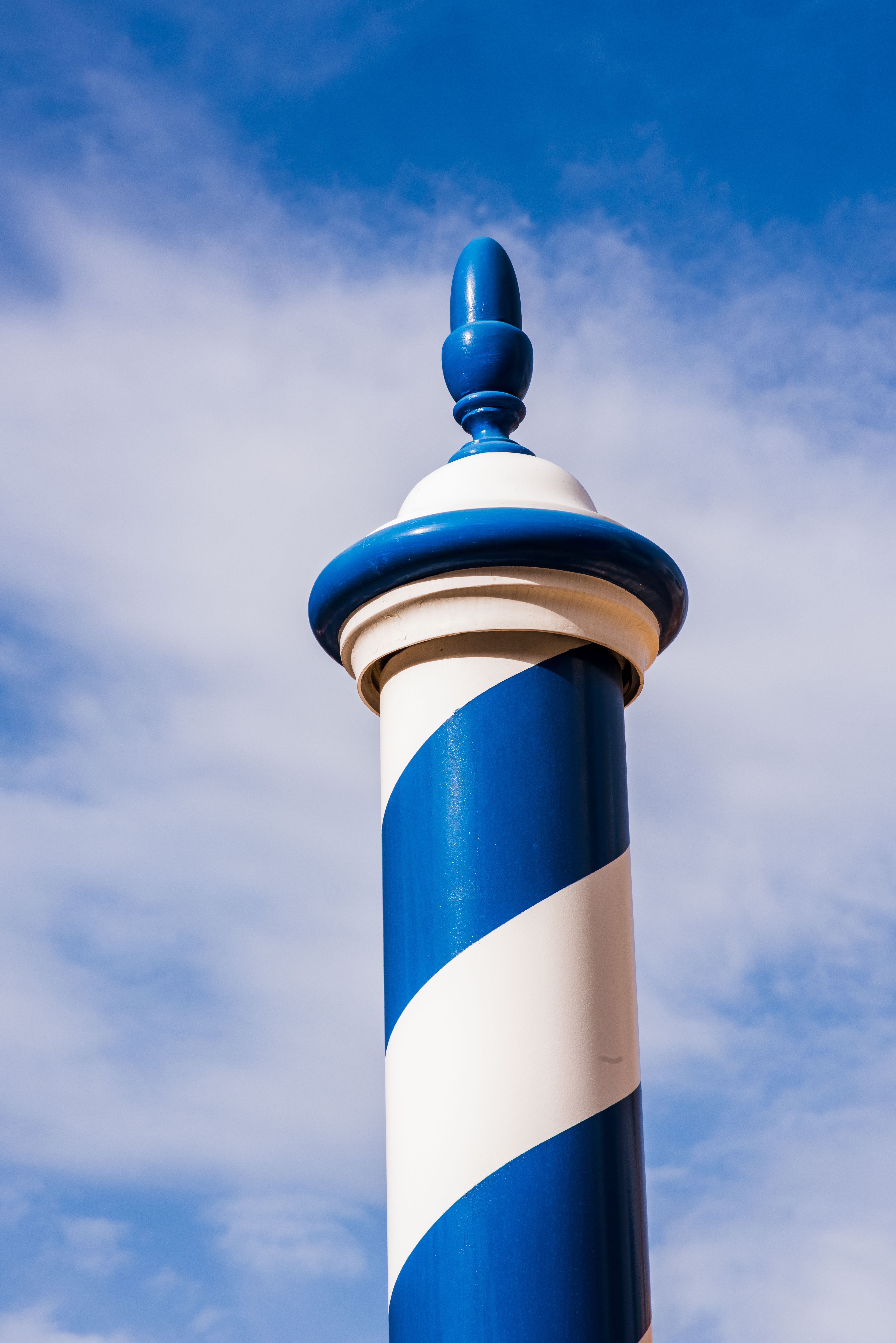 Spiral Blue and White Pole Against Sky · Free Stock Photo