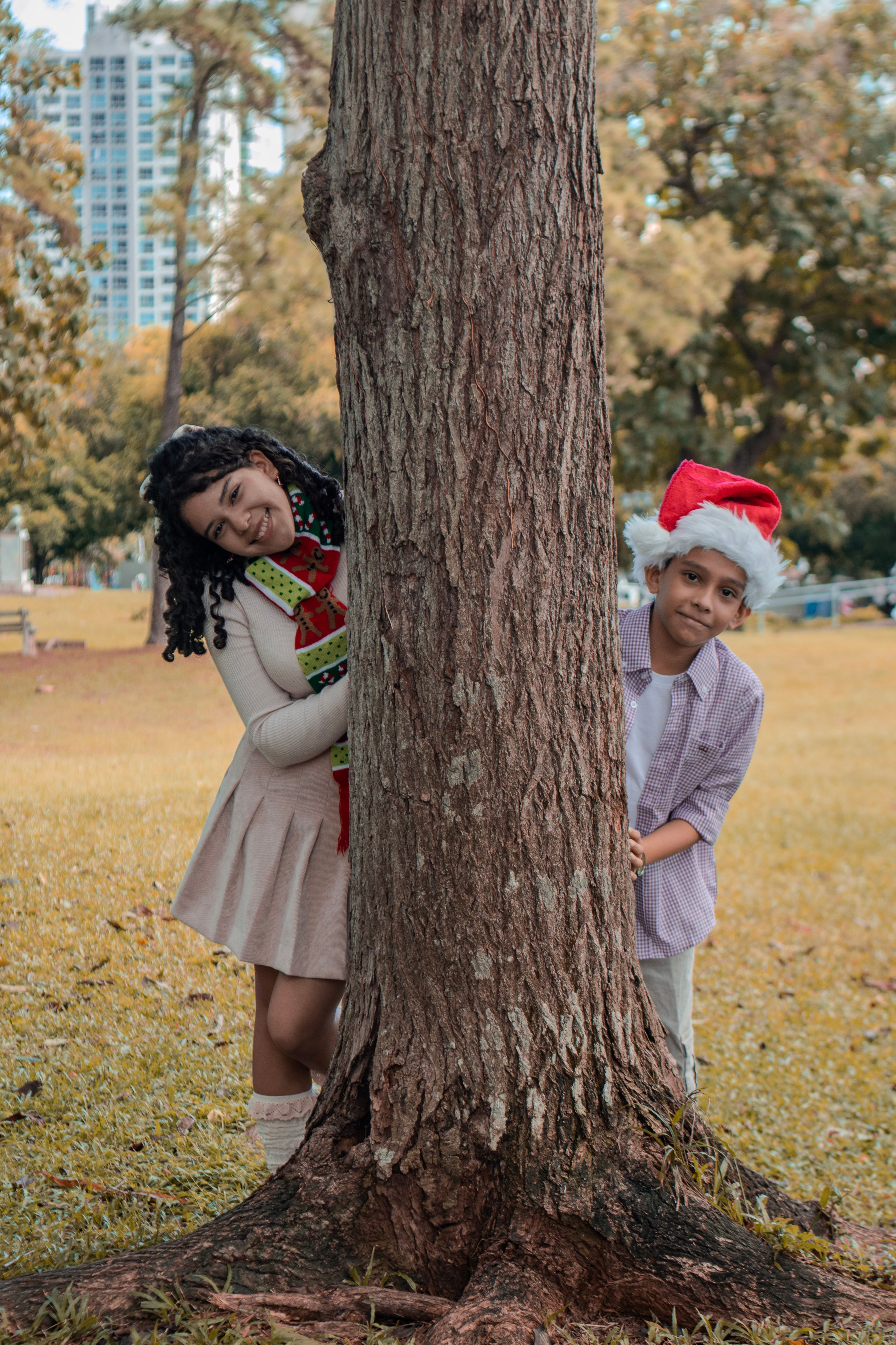 Children Playing Hide and Seek Outdoors in Winter · Free Stock Photo