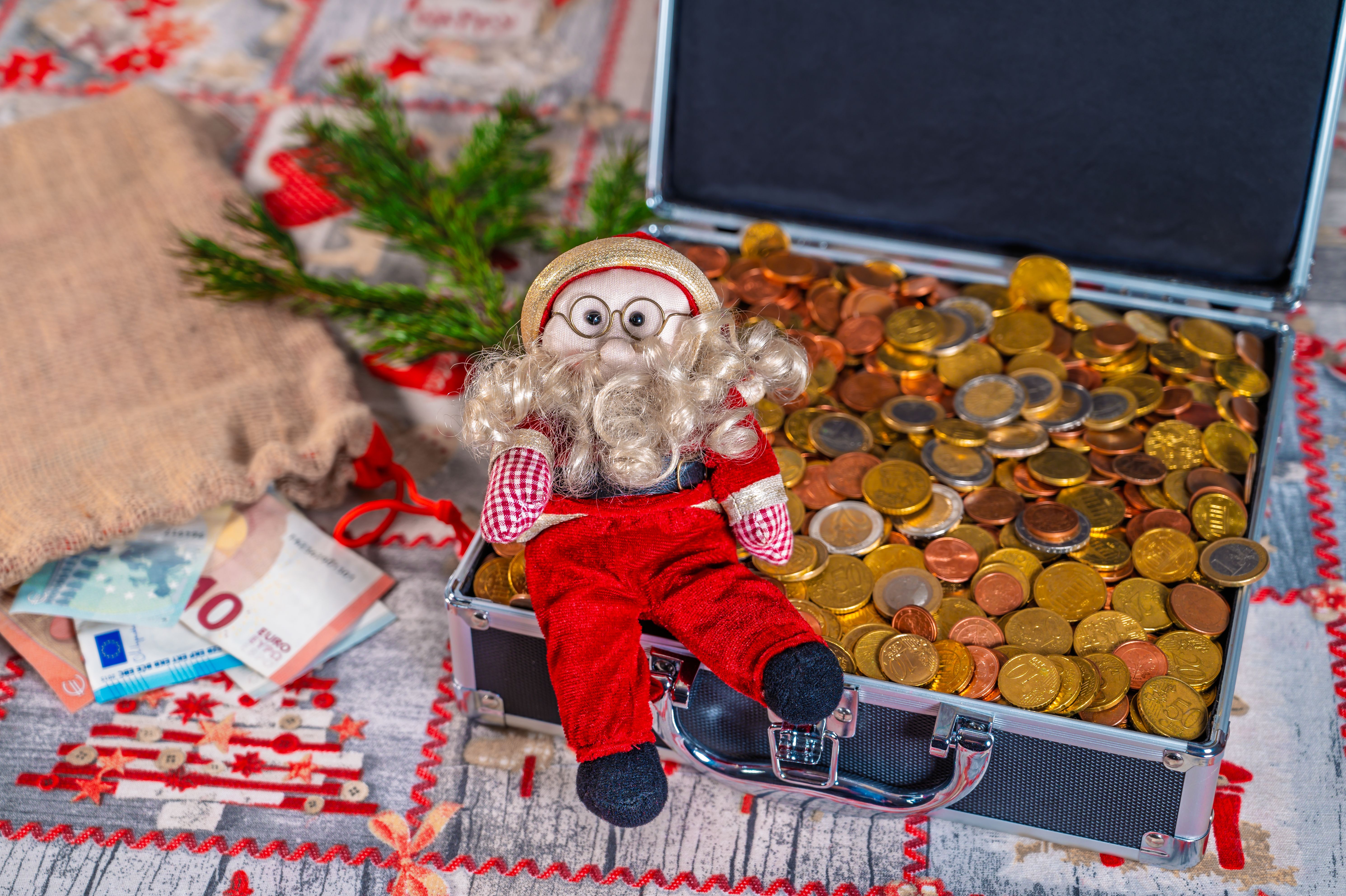 Festive Santa with Euro Coins and Christmas Decor · Free Stock Photo