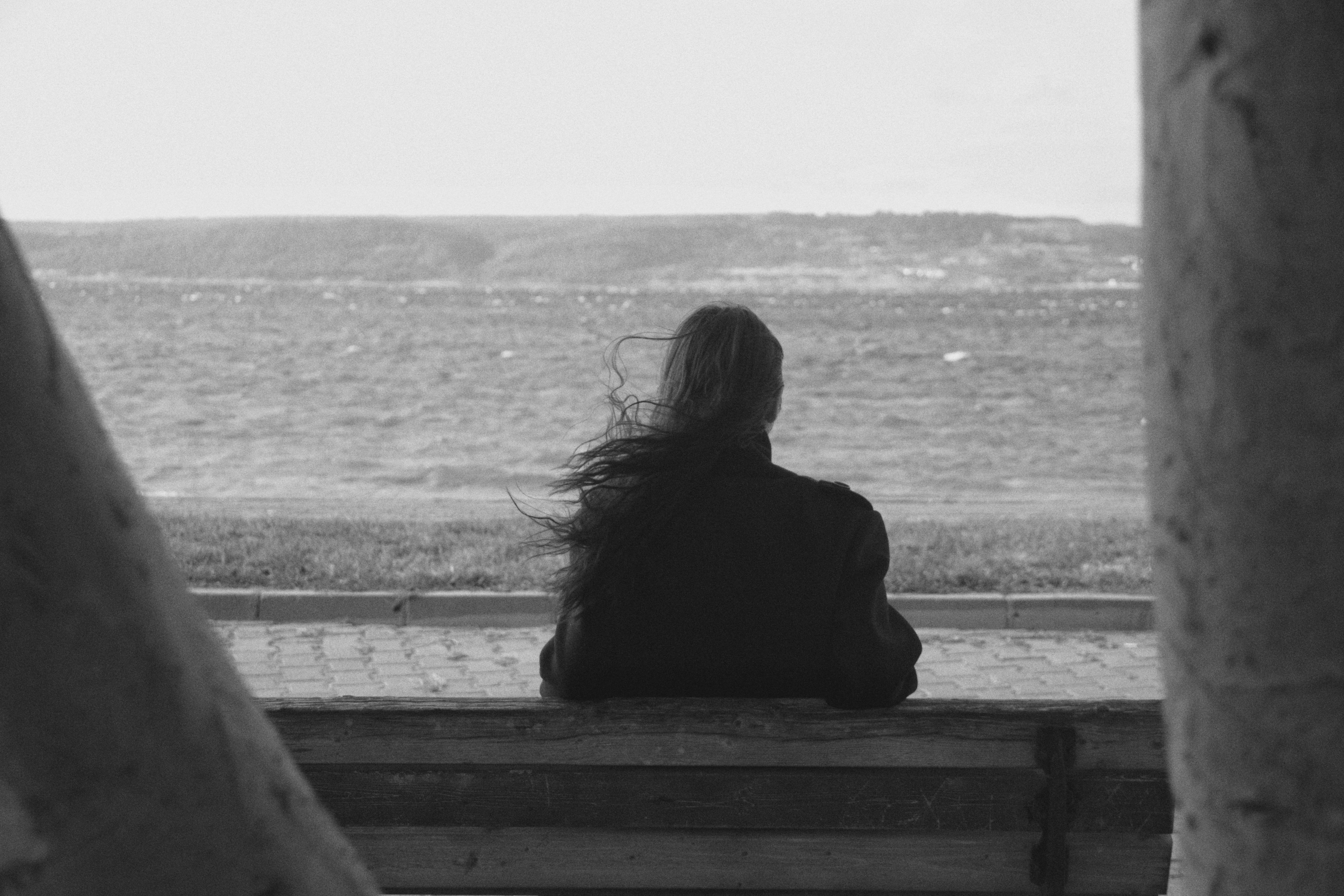 Woman Sitting By The Sea Photos, Download The BEST Free Woman Sitting ...