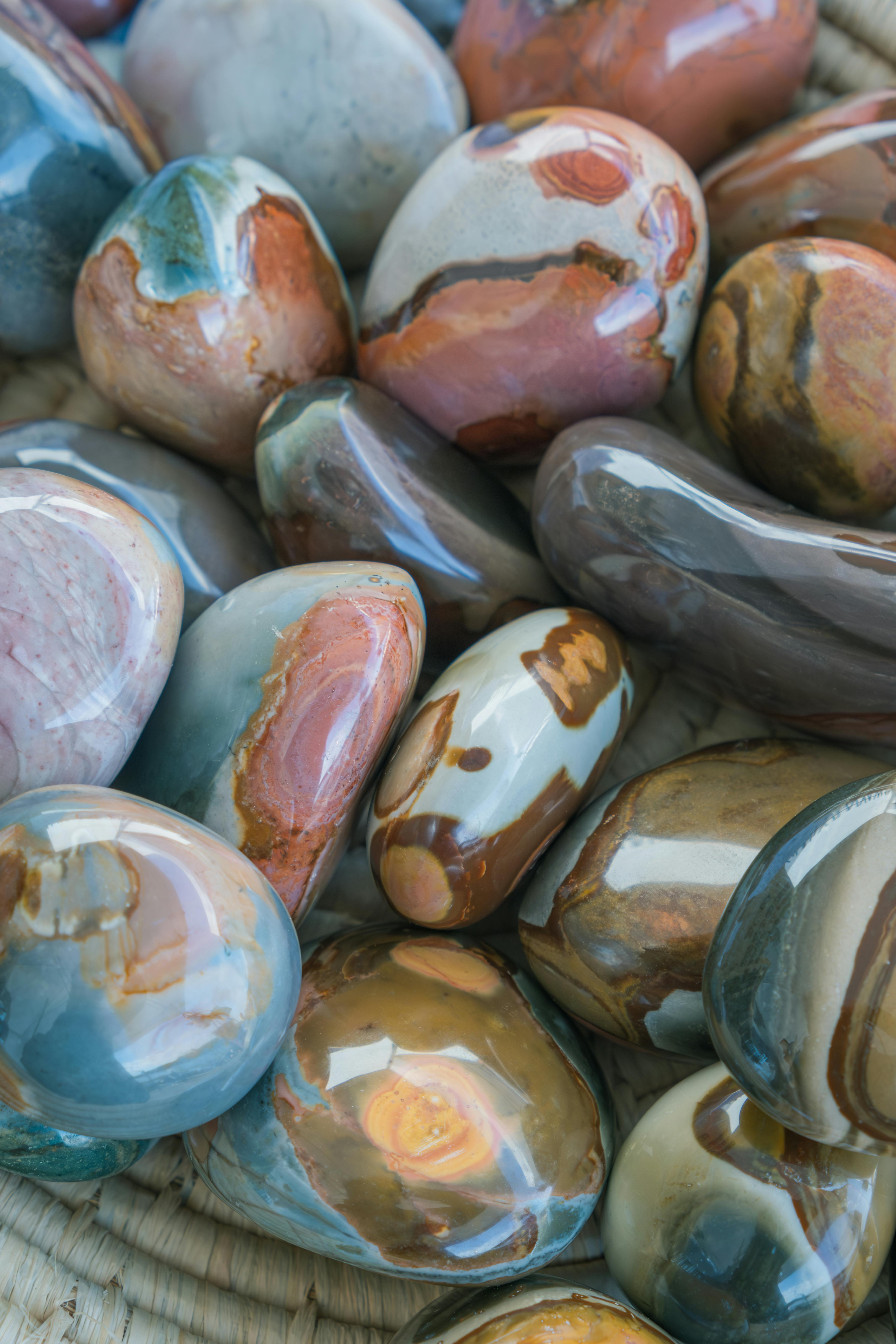 Close-Up of Polished Multi-Colored Gemstones · Free Stock Photo