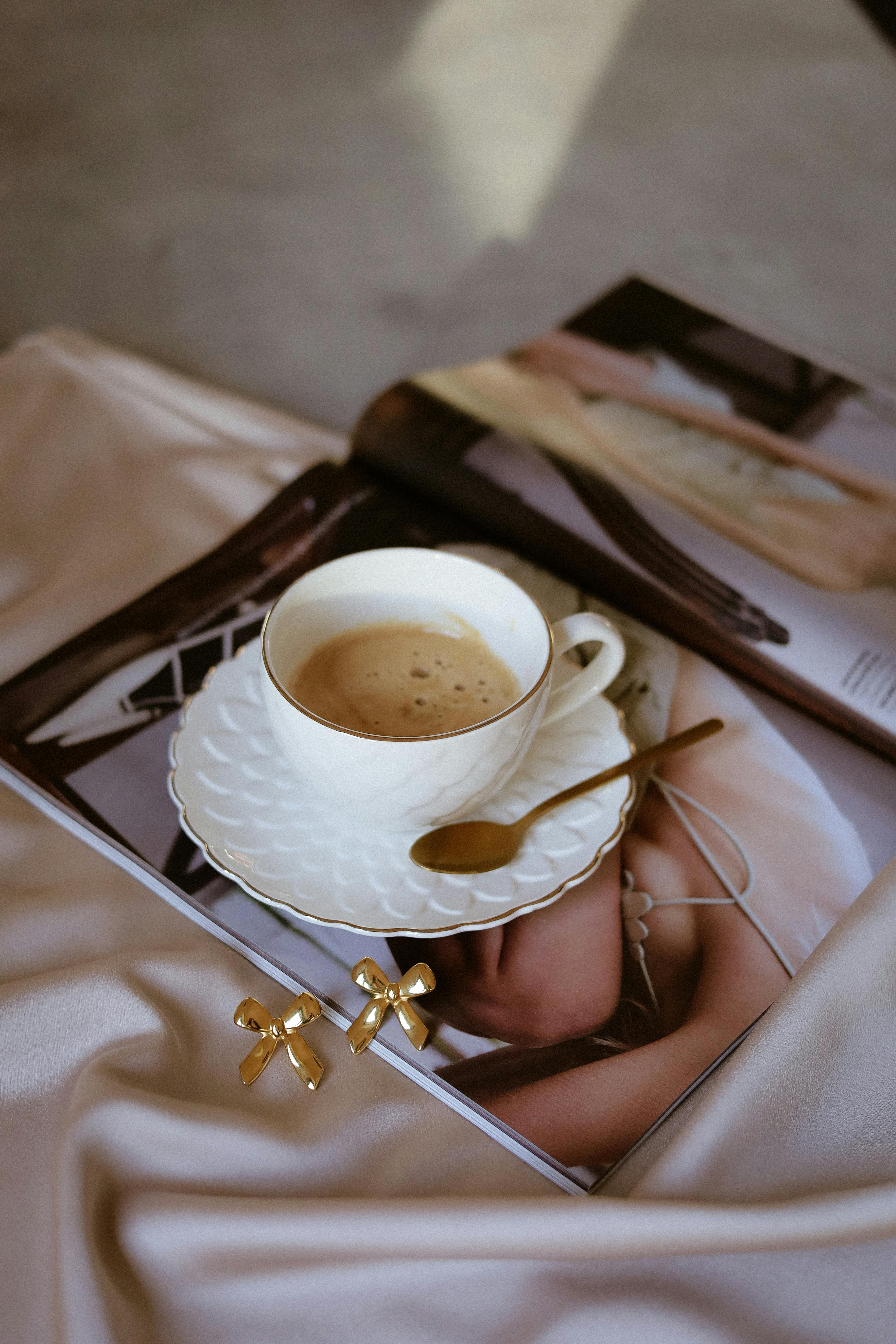 Elegant Coffee Setting with Fashion Magazine · Free Stock Photo