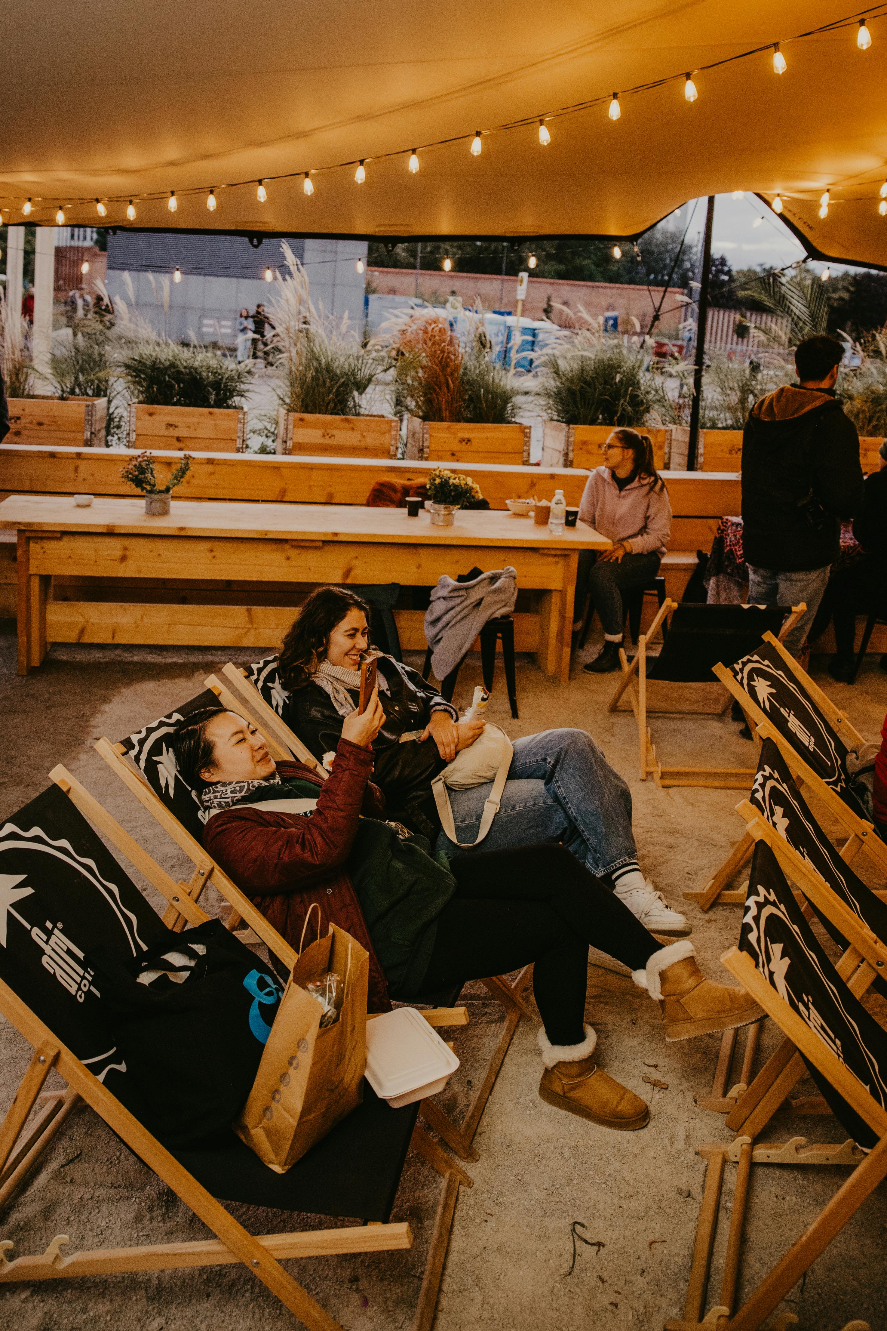 Chill Evening Under String Lights in Berlin · Free Stock Photo