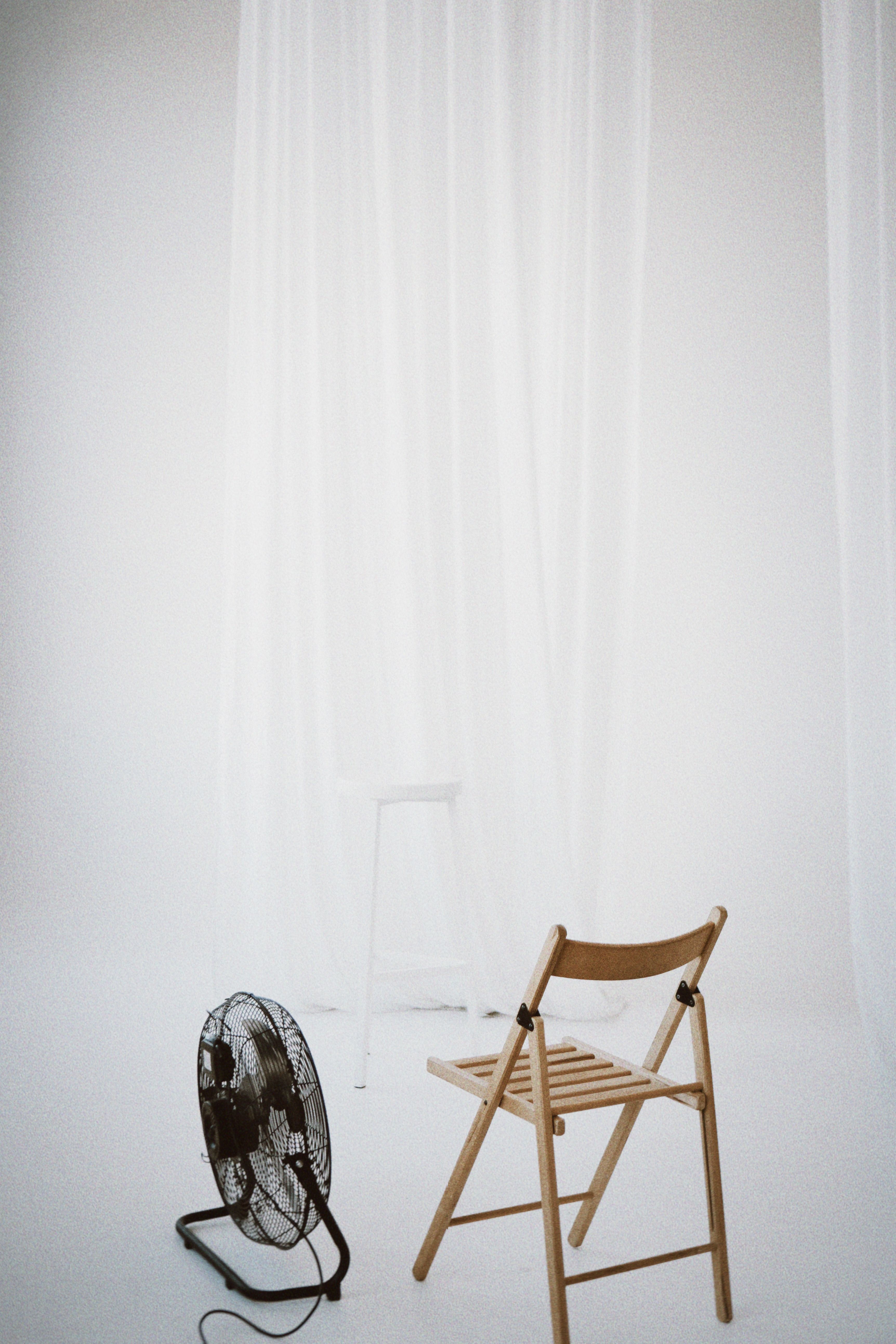 Minimalist Interior with Fan and Chair Scene · Free Stock Photo