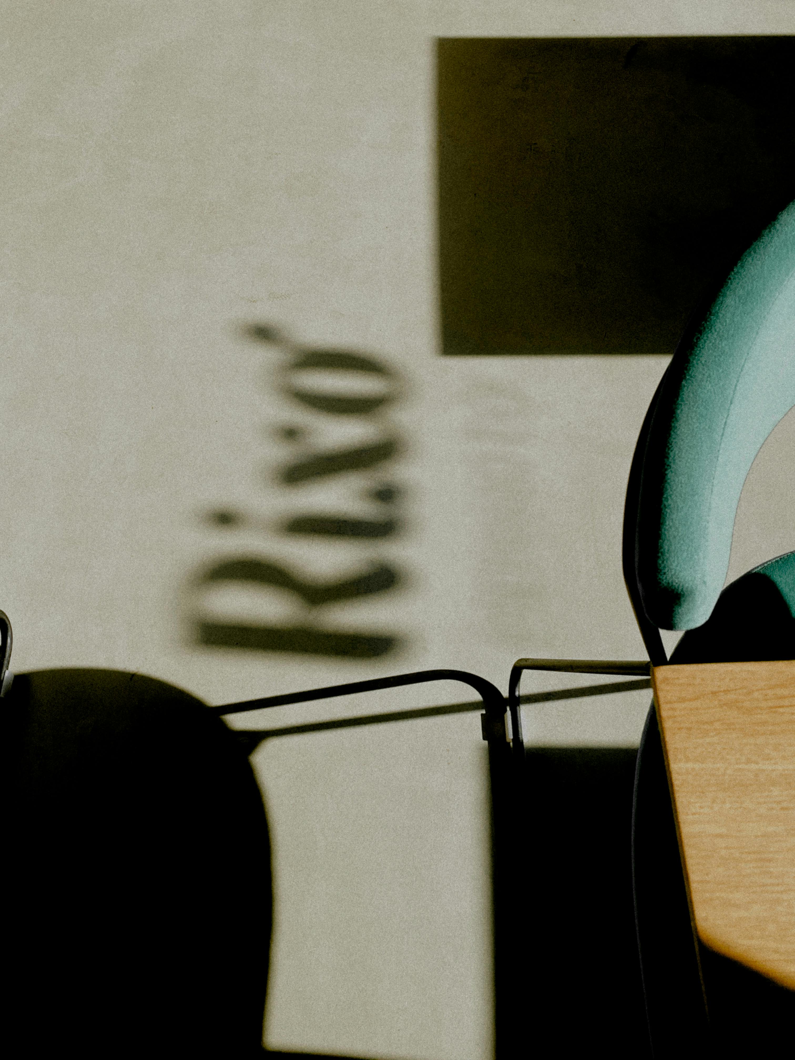 Abstract Shadow and Chair Composition · Free Stock Photo