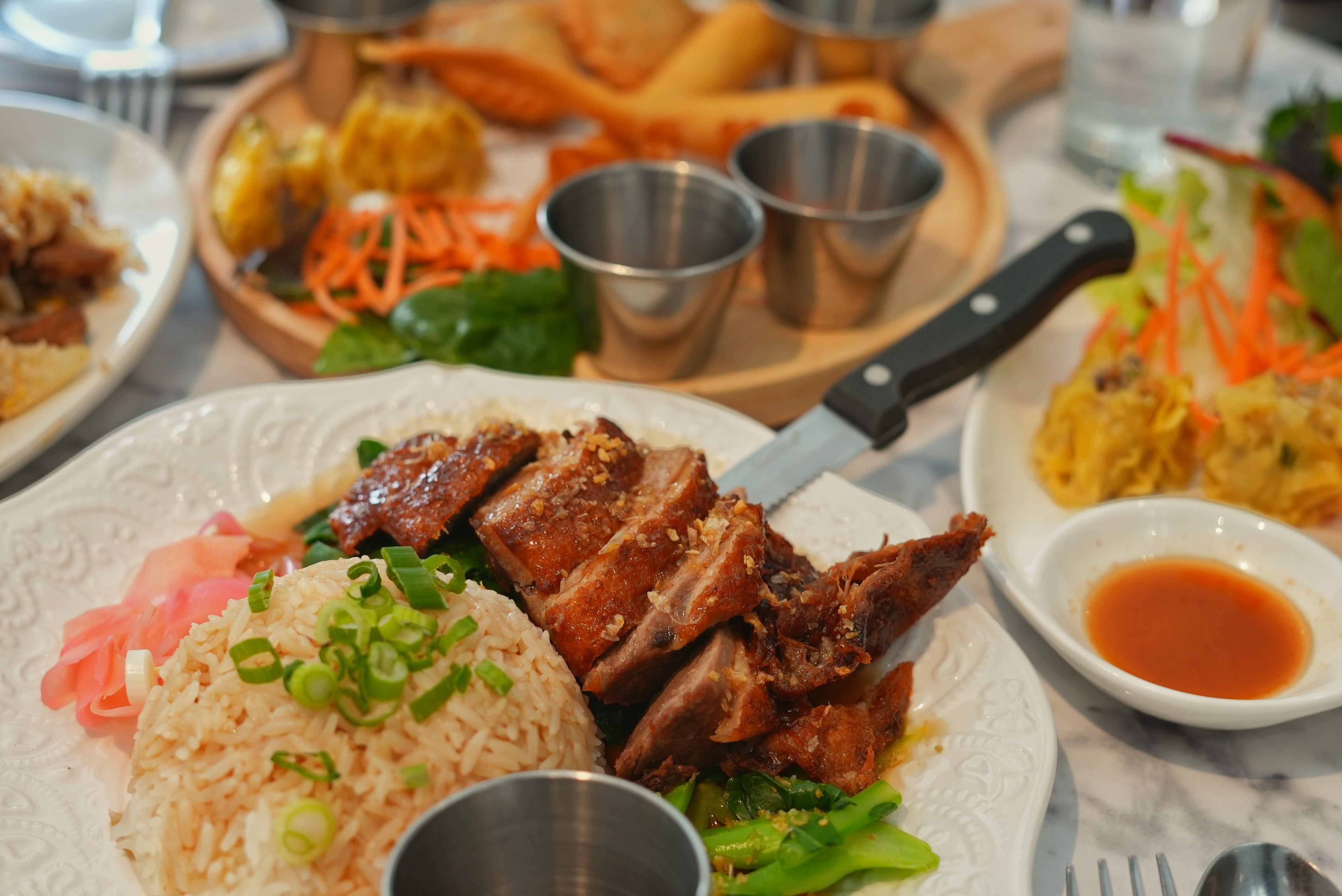 Delicious Asian Cuisine with Crispy Duck and Rice · Free Stock Photo