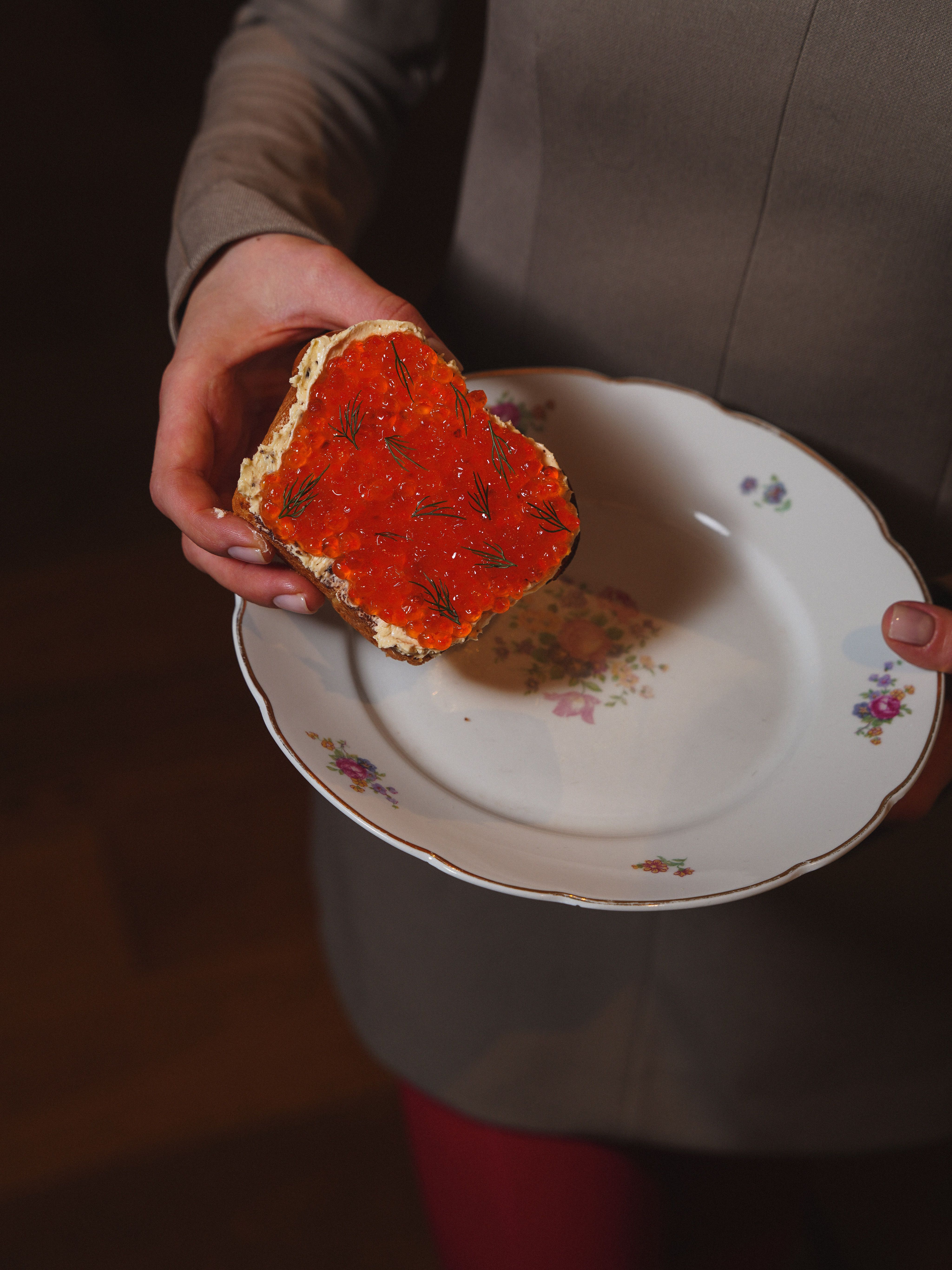 Person Holding Fresh Bread with Red Jam · Free Stock Photo