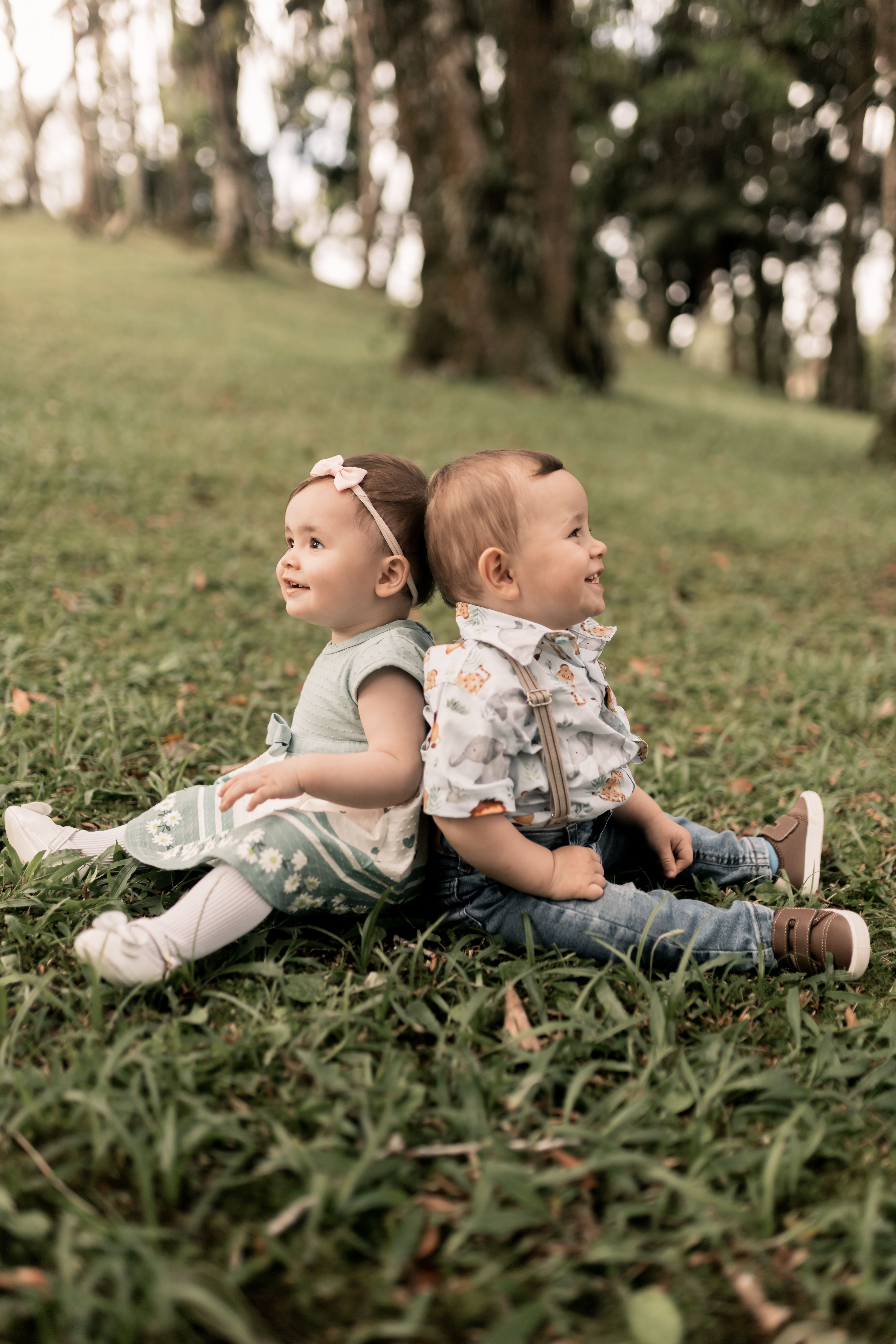 Adorable Babies Playing in a Forest Setting · Free Stock Photo