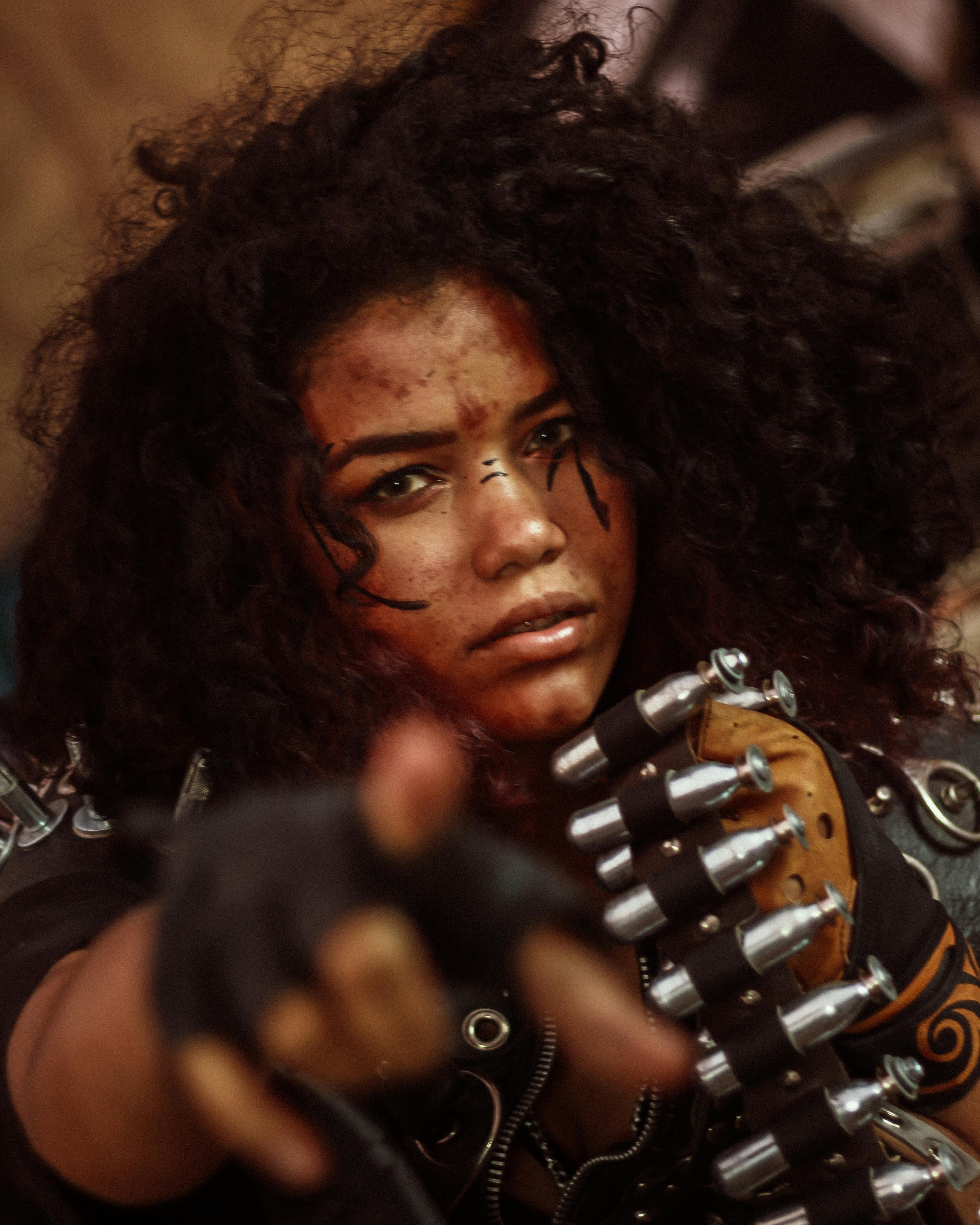 Fierce Warrior with Spike Armor in Action Pose · Free Stock Photo