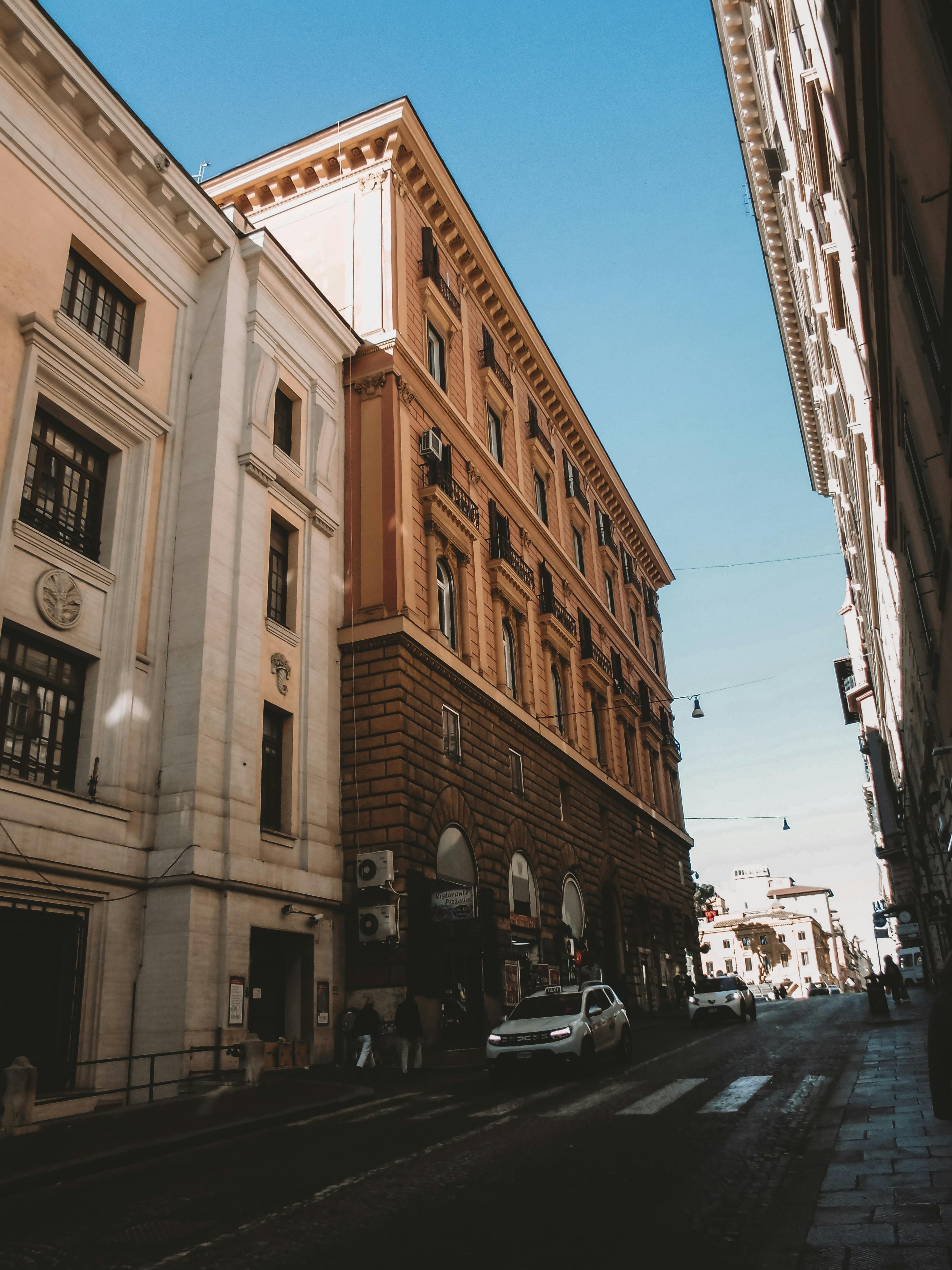 Historic Street View in Rome with Classic Architecture · Free Stock Photo