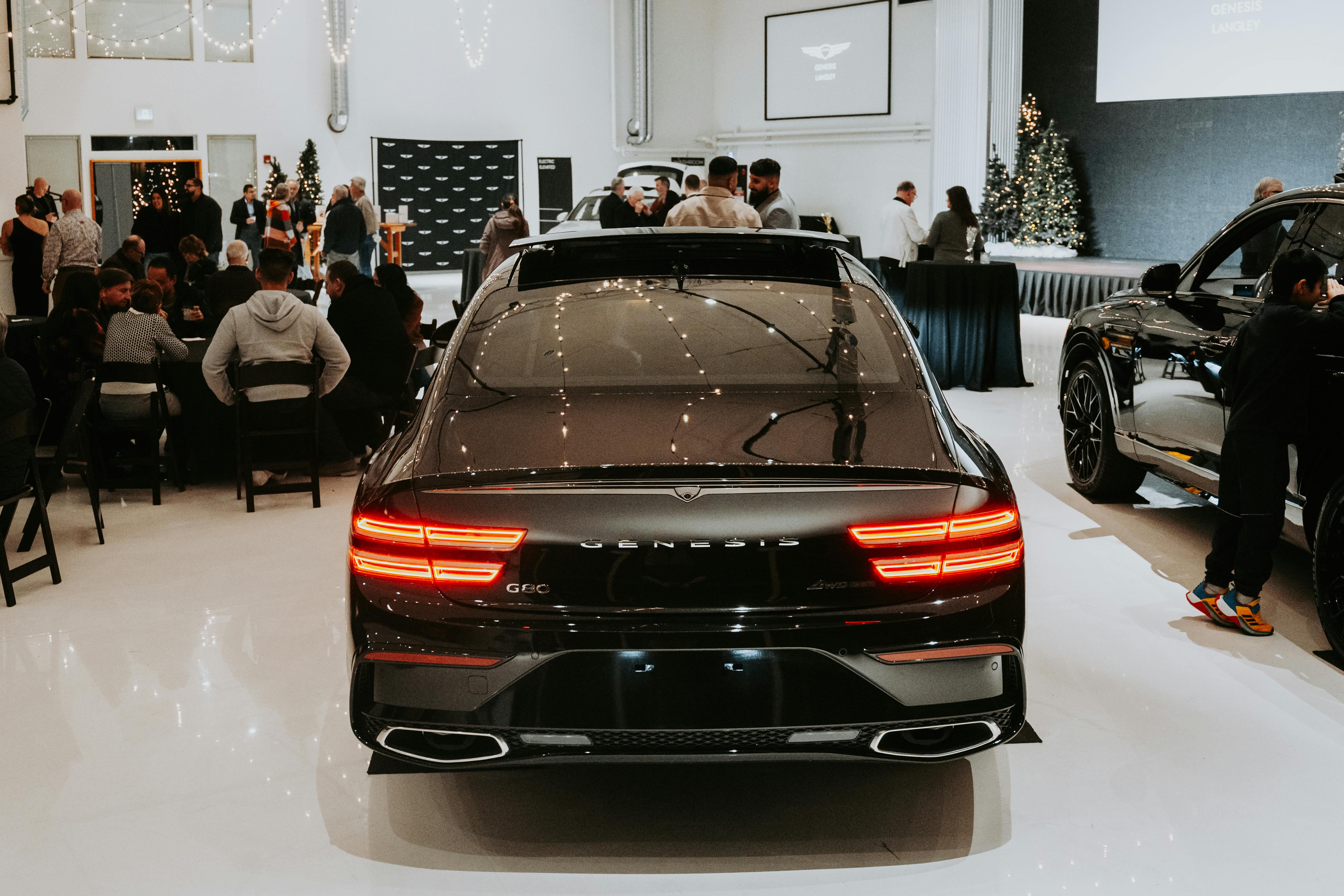 Luxury Car Launch Event with Attendees · Free Stock Photo
