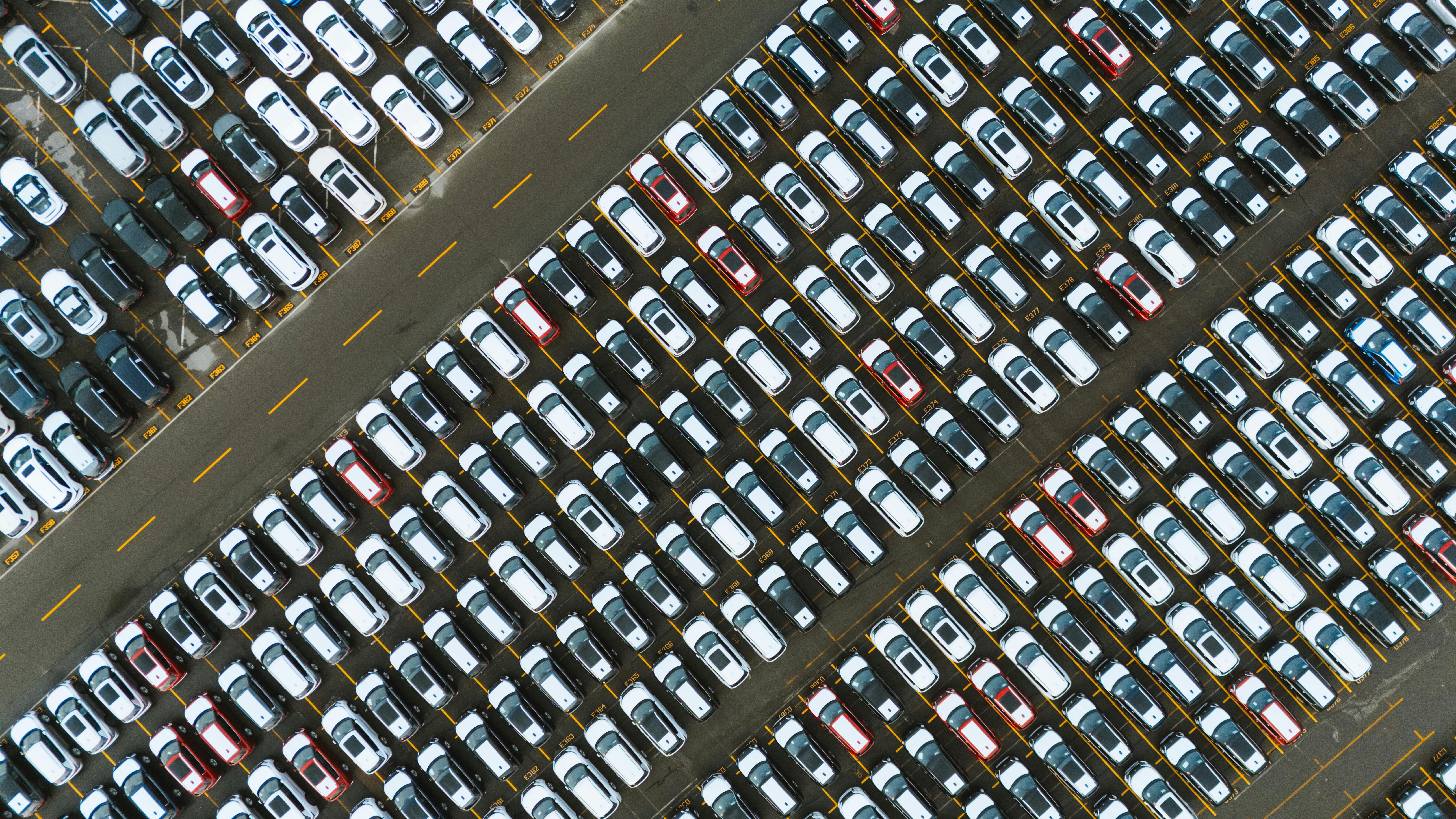 Aerial View of Crowded Parking Lot with Cars · Free Stock Photo