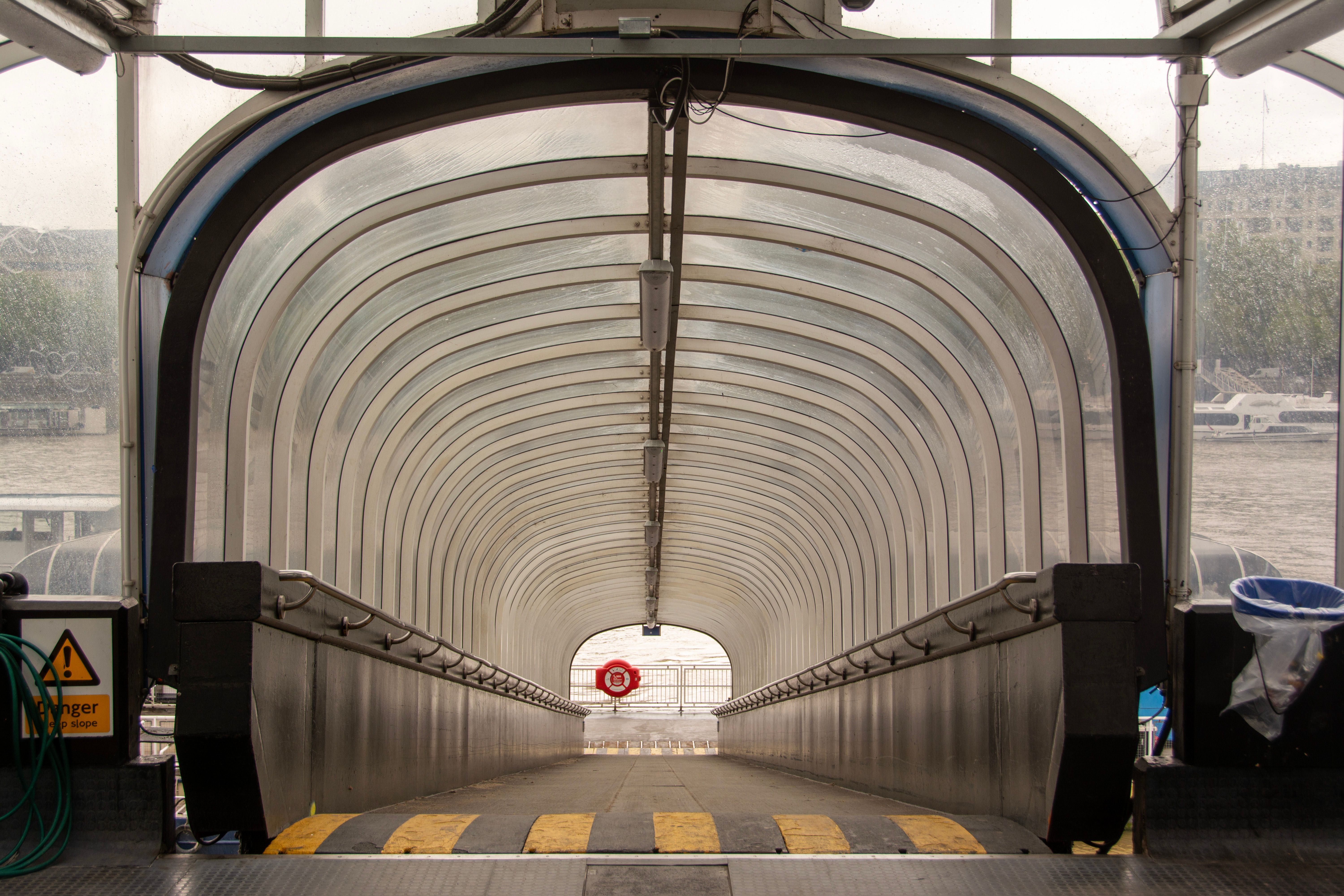 Futuristic Transparent Tunnel Architecture · Free Stock Photo
