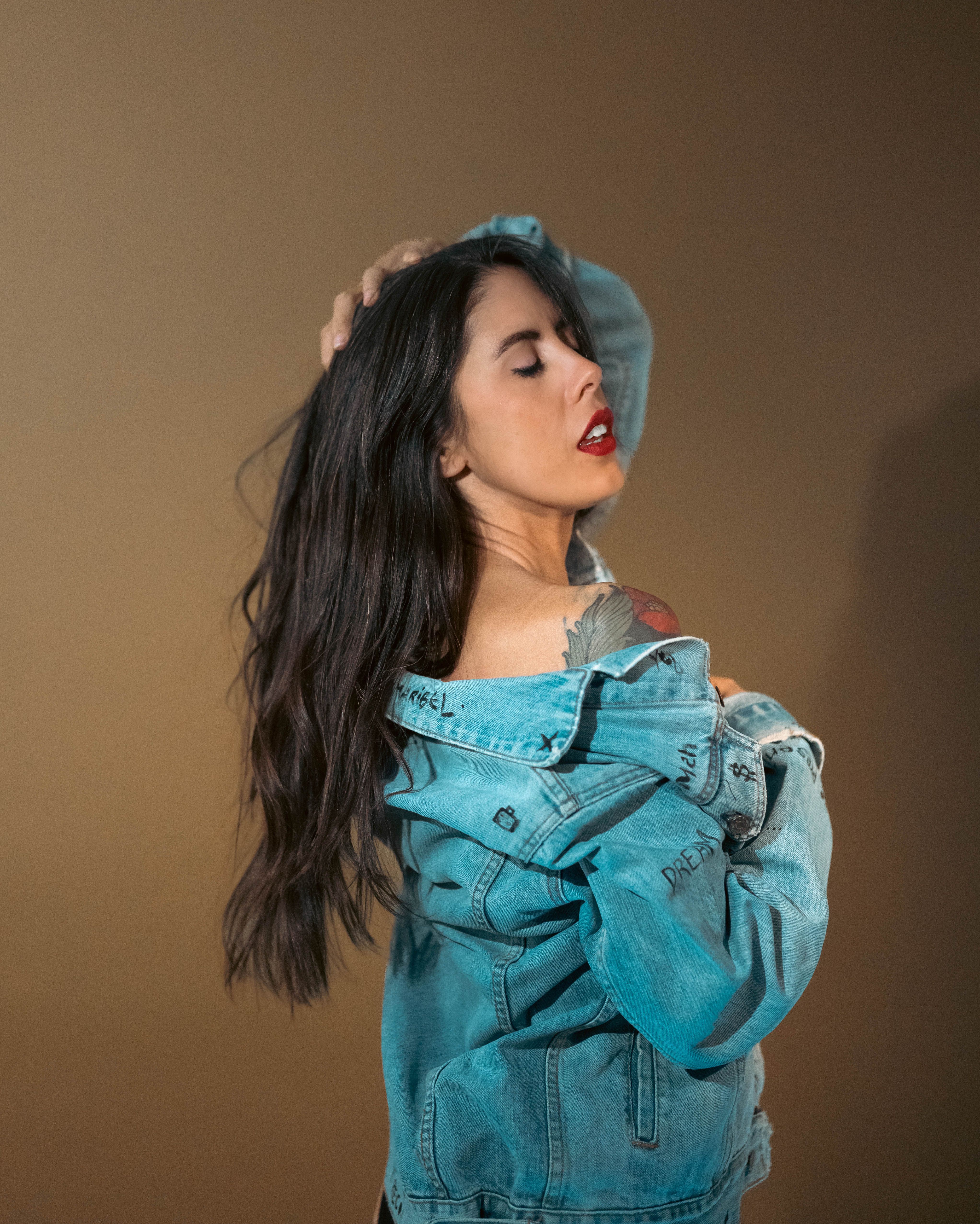 Stylish Latina Model in Denim Jacket Portrait · Free Stock Photo