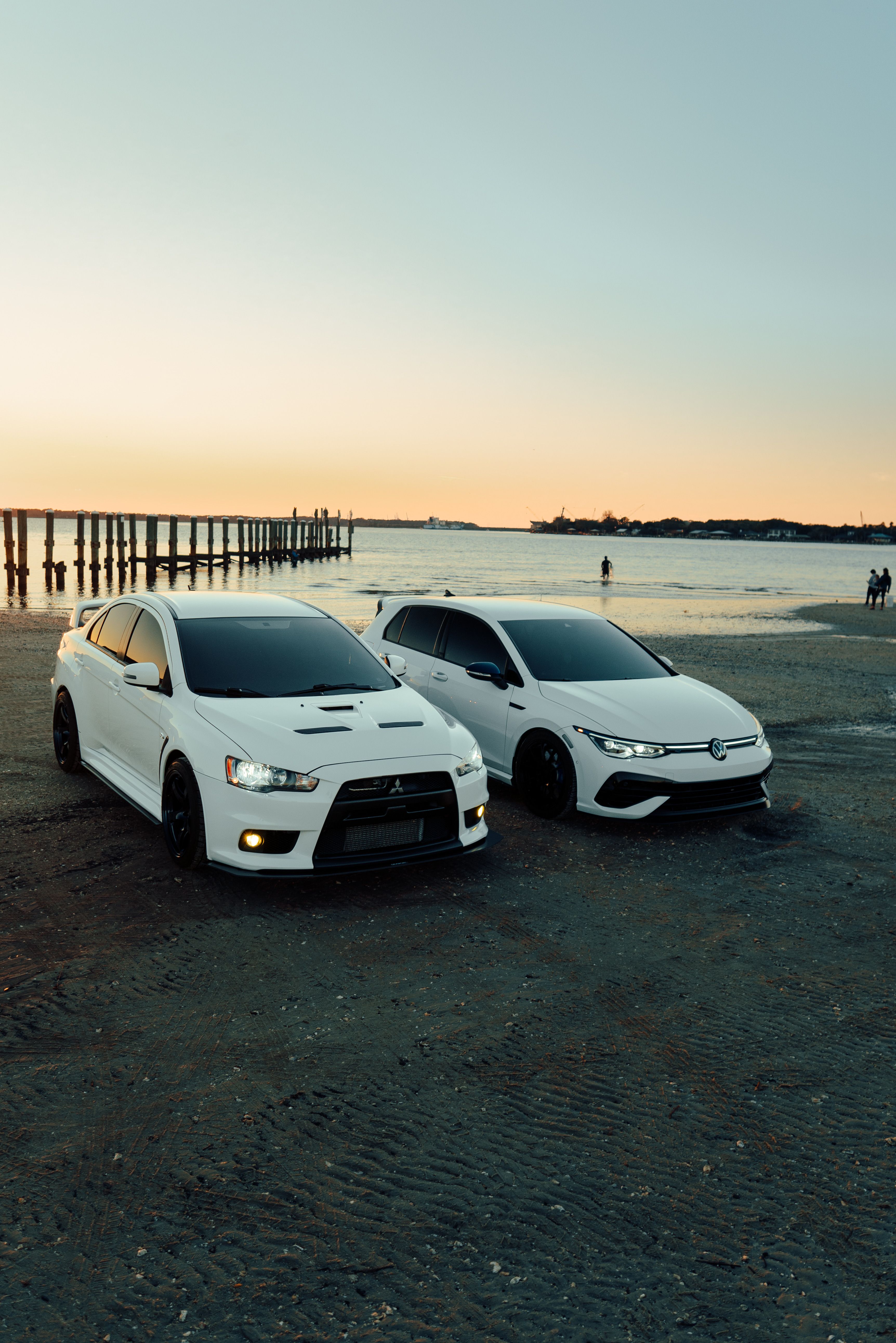Two White Cars on Sandy Beach at Sunset · Free Stock Photo