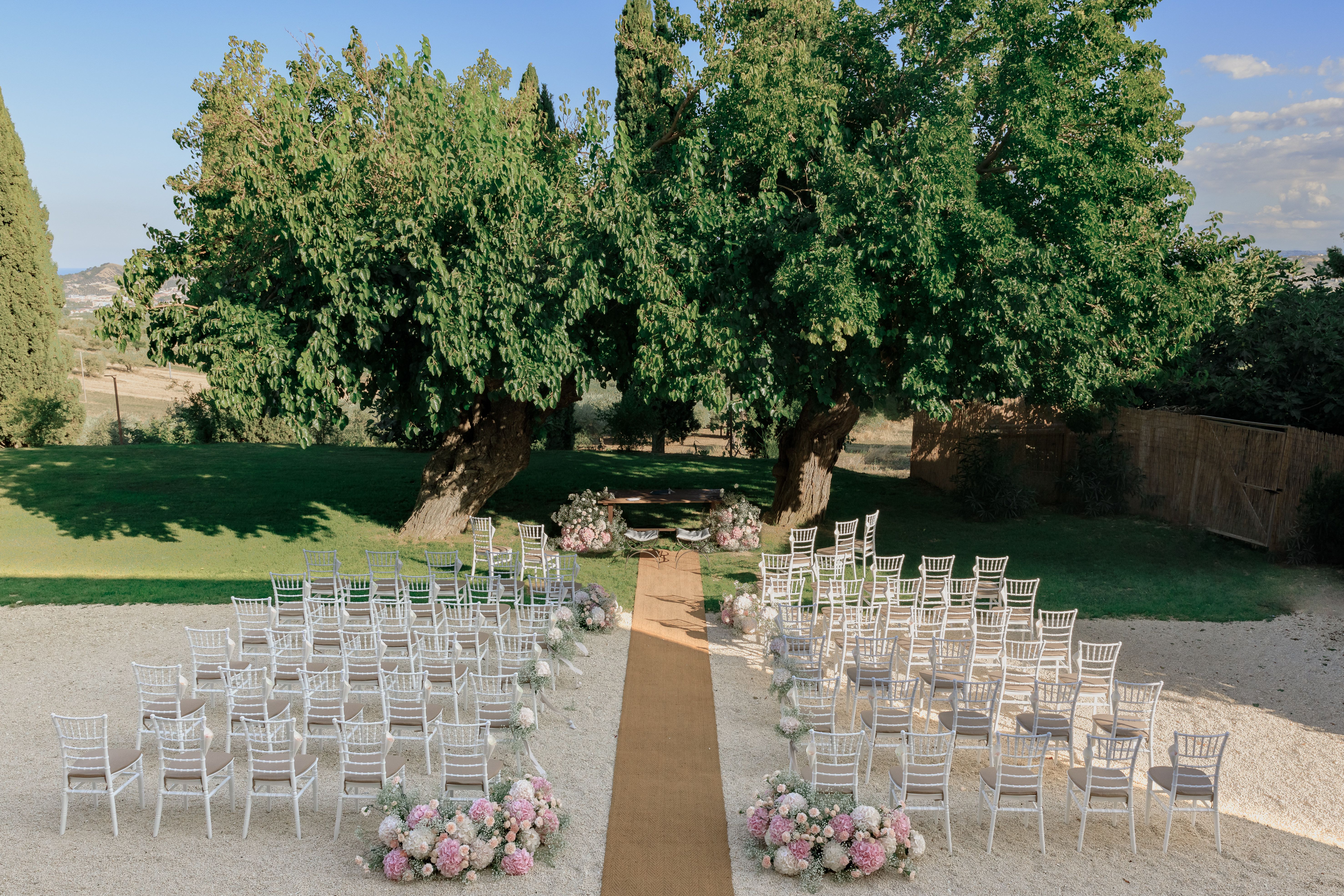 Elegant Outdoor Wedding Setup in Italian Garden · Free Stock Photo