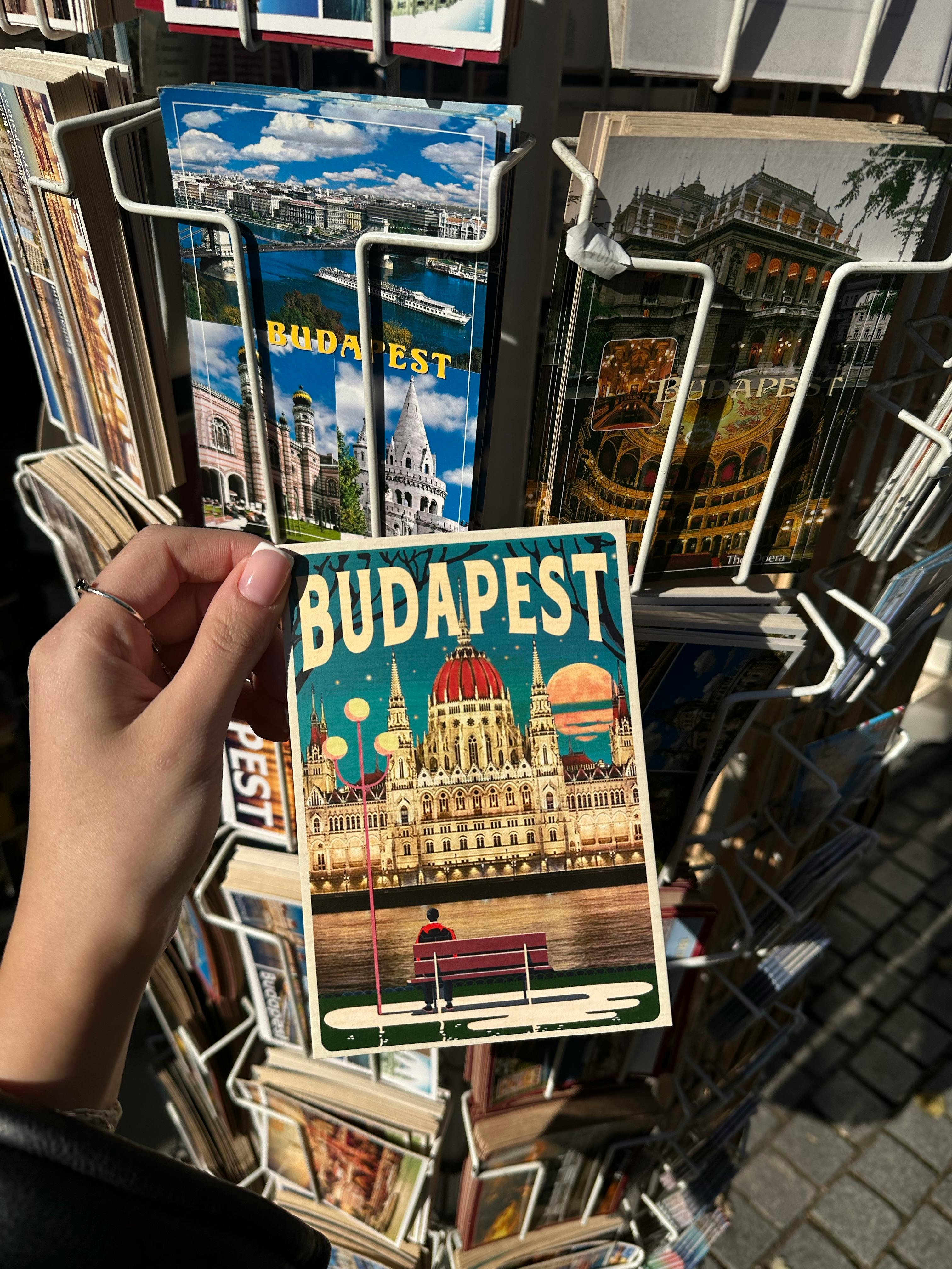 Colorful Budapest Postcards in Outdoor Display · Free Stock Photo