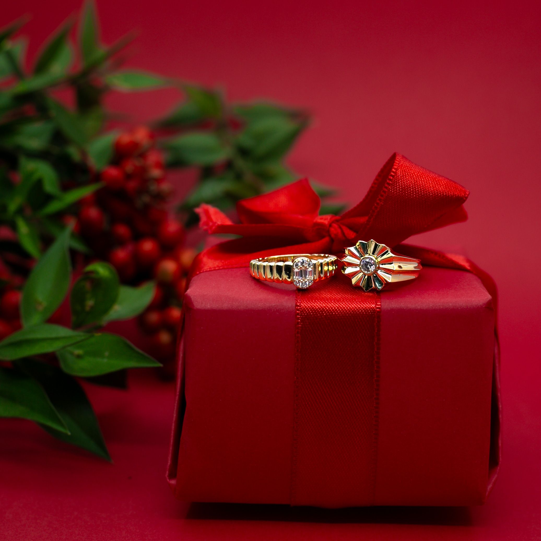Elegant Gold Rings on Christmas Gift Box · Free Stock Photo