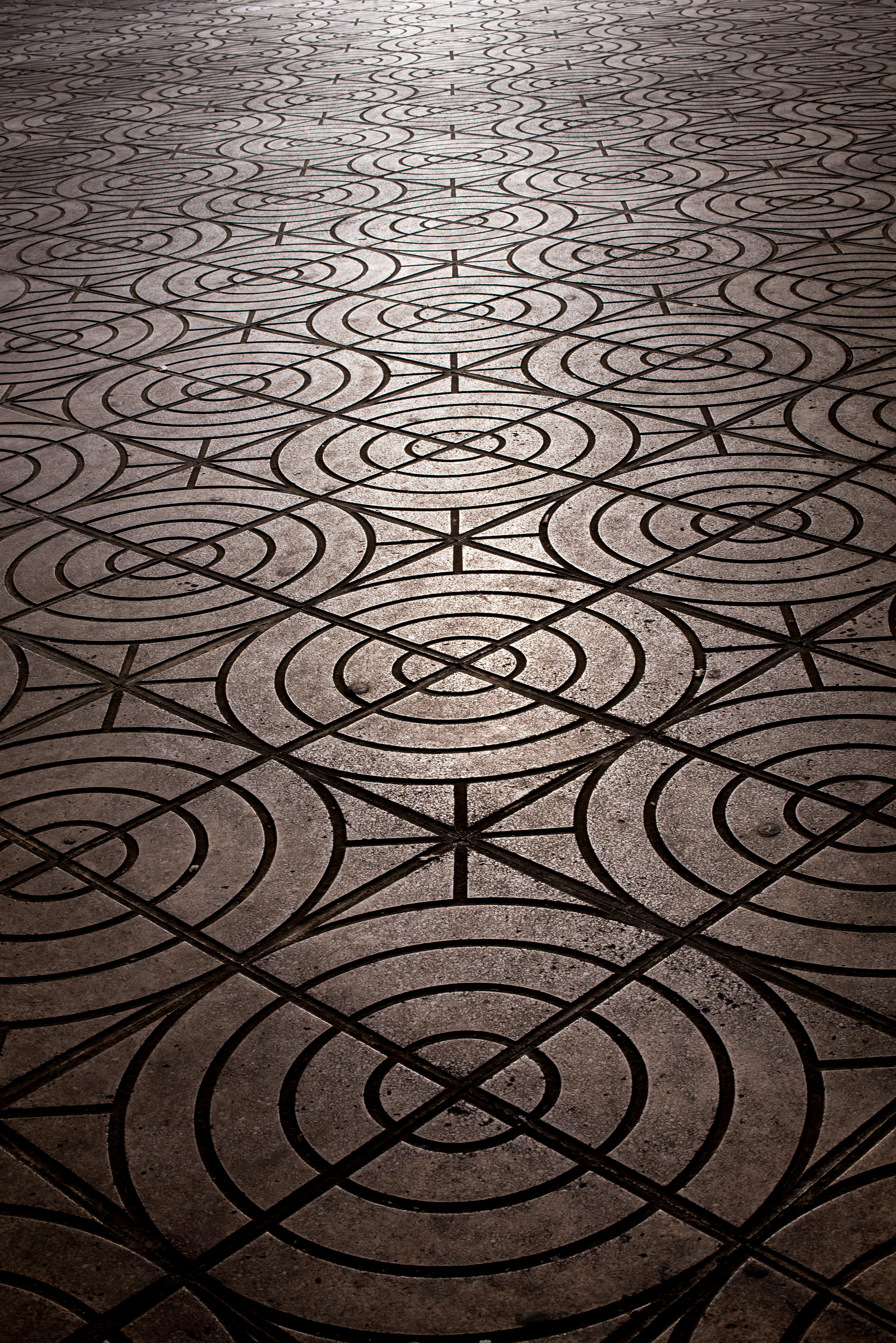 Intricate Circular Patterned Pavement · Free Stock Photo