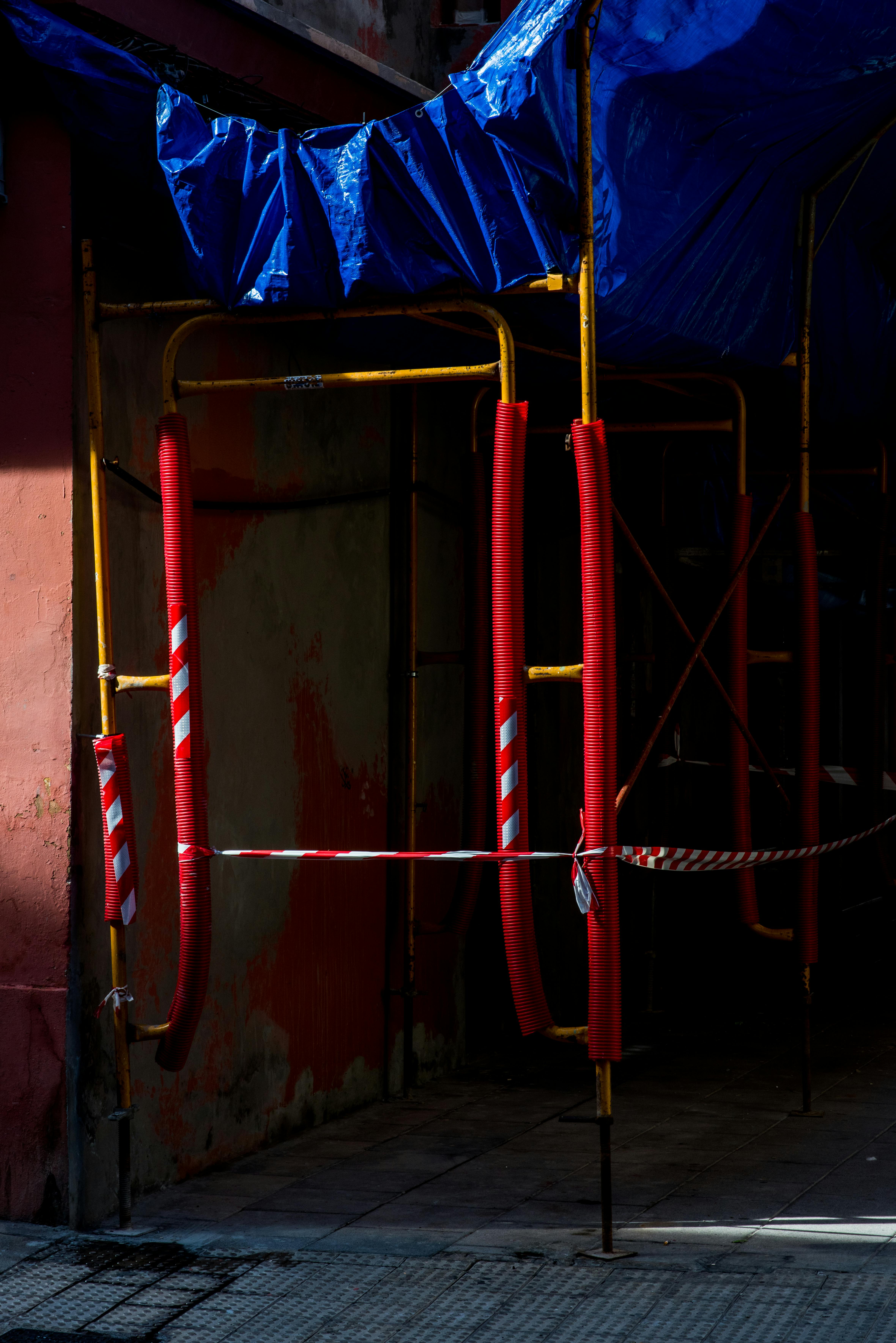 Scaffold Structure with Protective Wrapping Outdoors · Free Stock Photo
