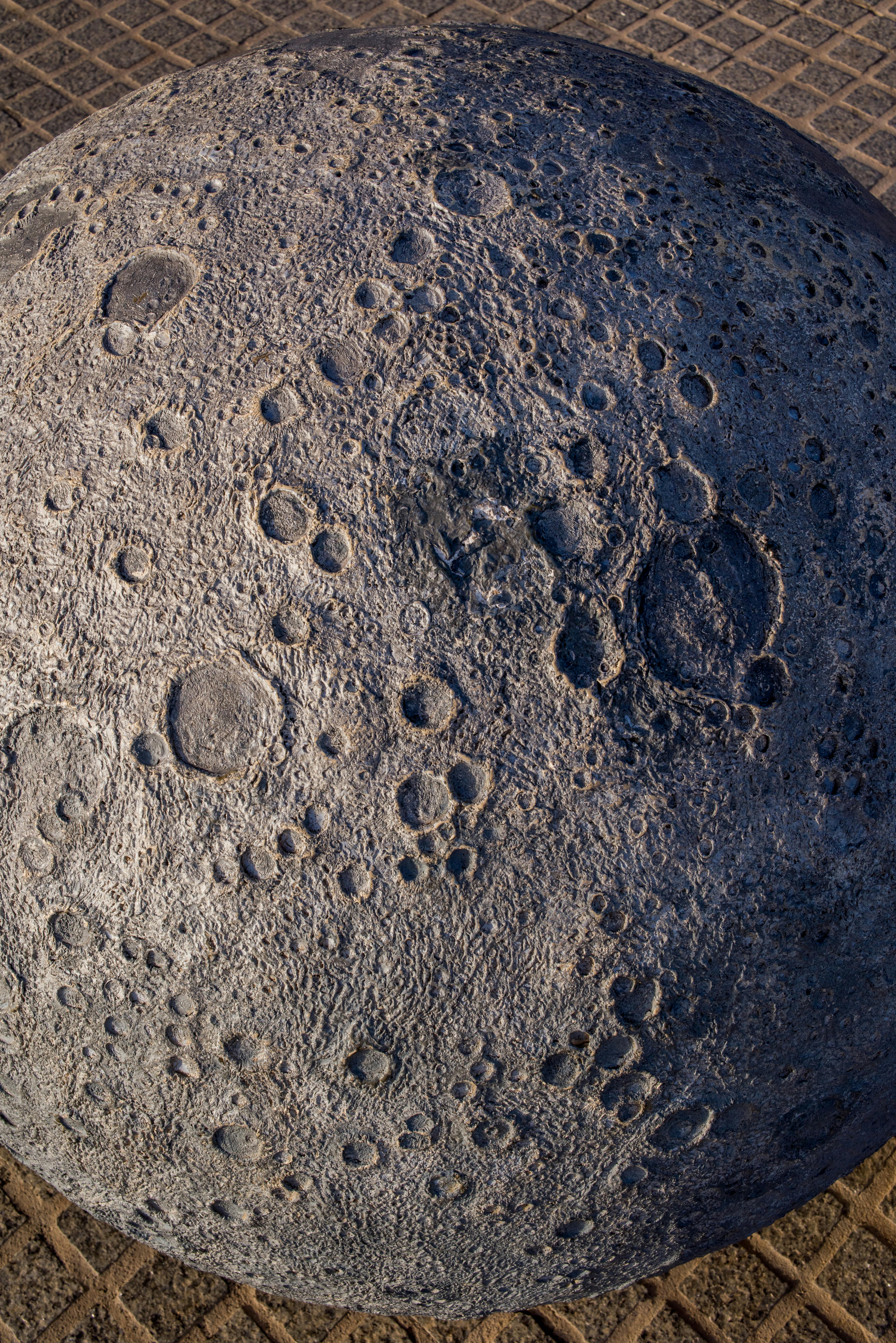 Close-up of Cratered Moon-Like Sculpture · Free Stock Photo