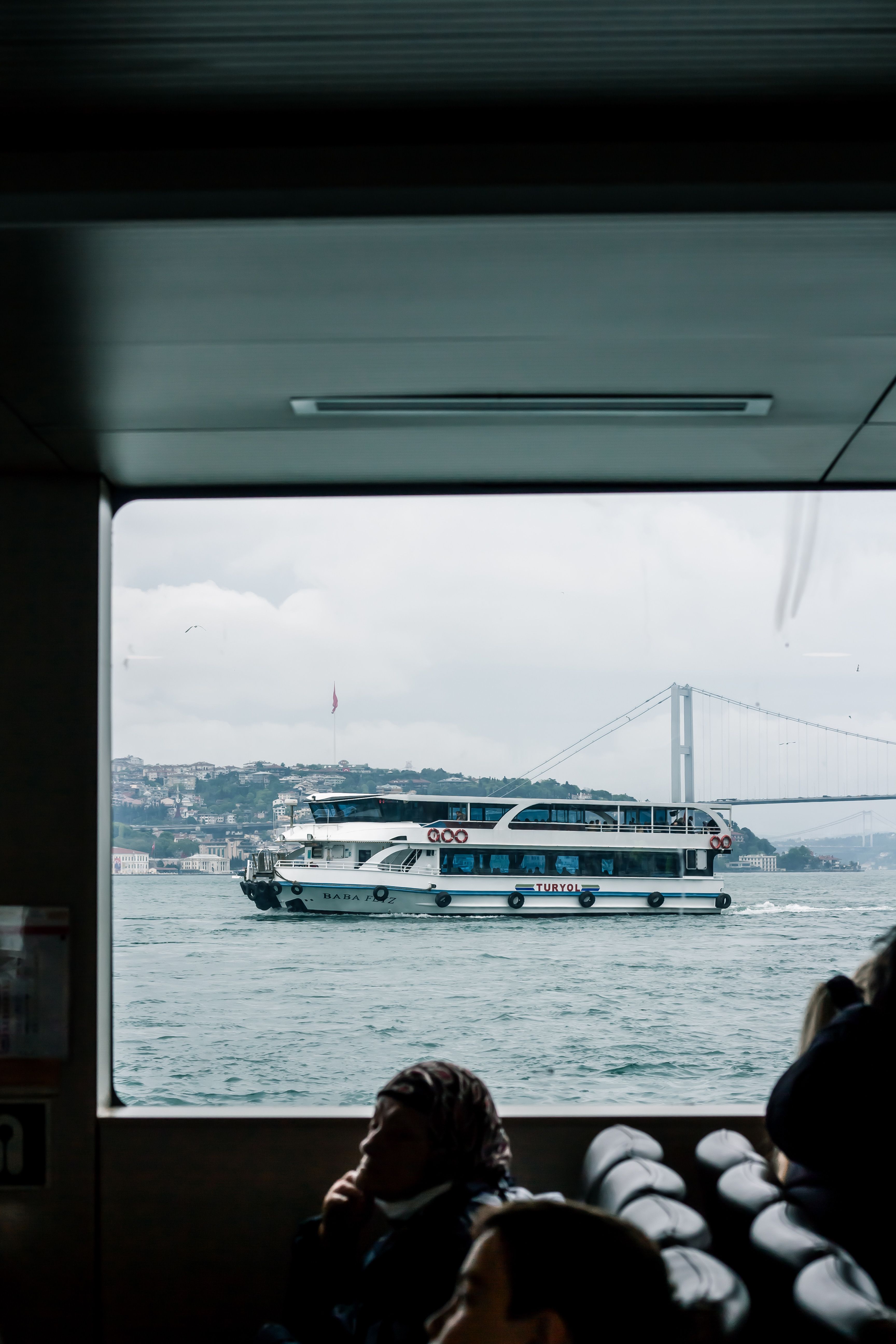Ferry view of Istanbul's Bosphorus Bridge · Free Stock Photo