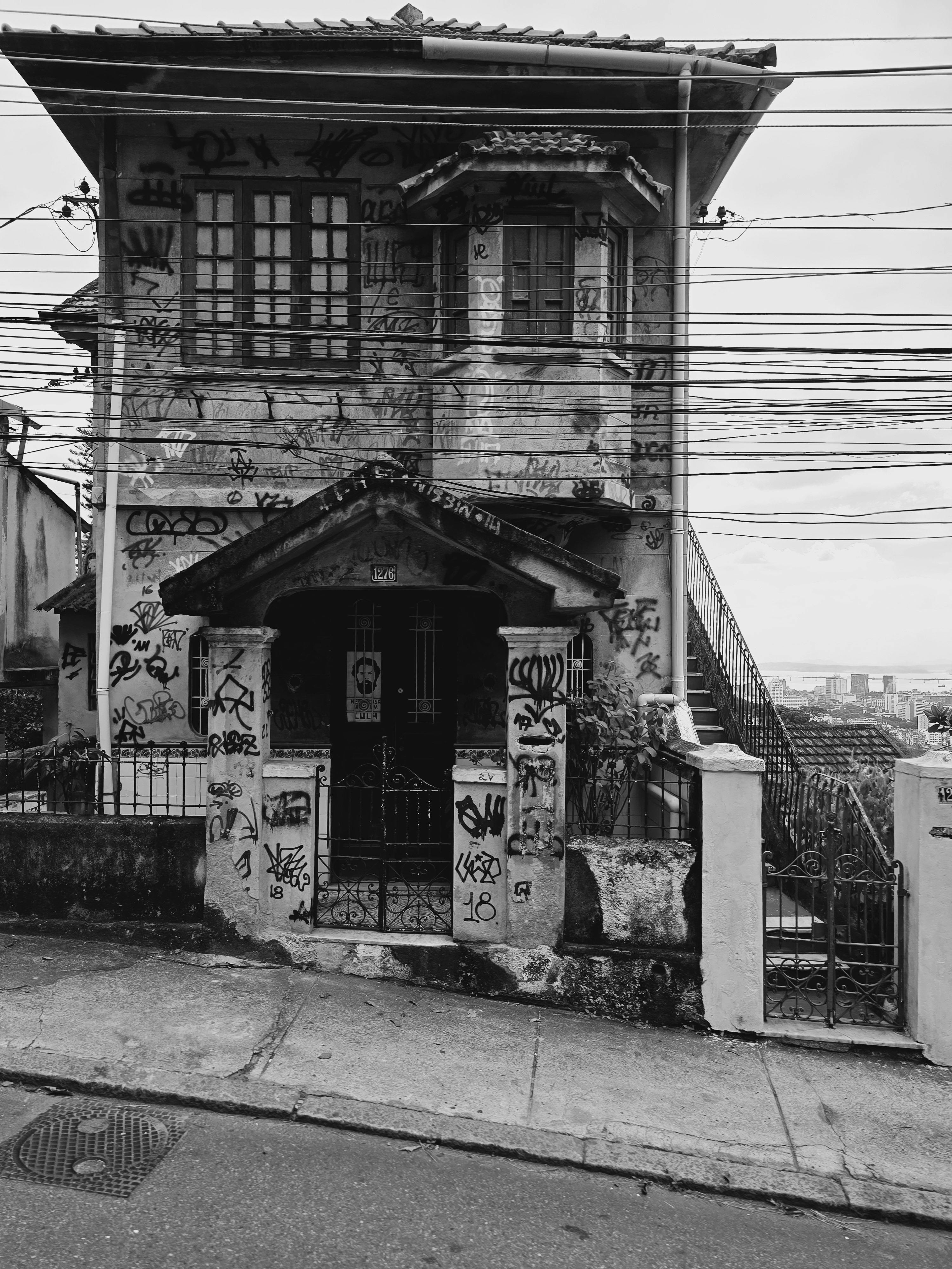 Graffiti-Covered House on Urban Street · Free Stock Photo