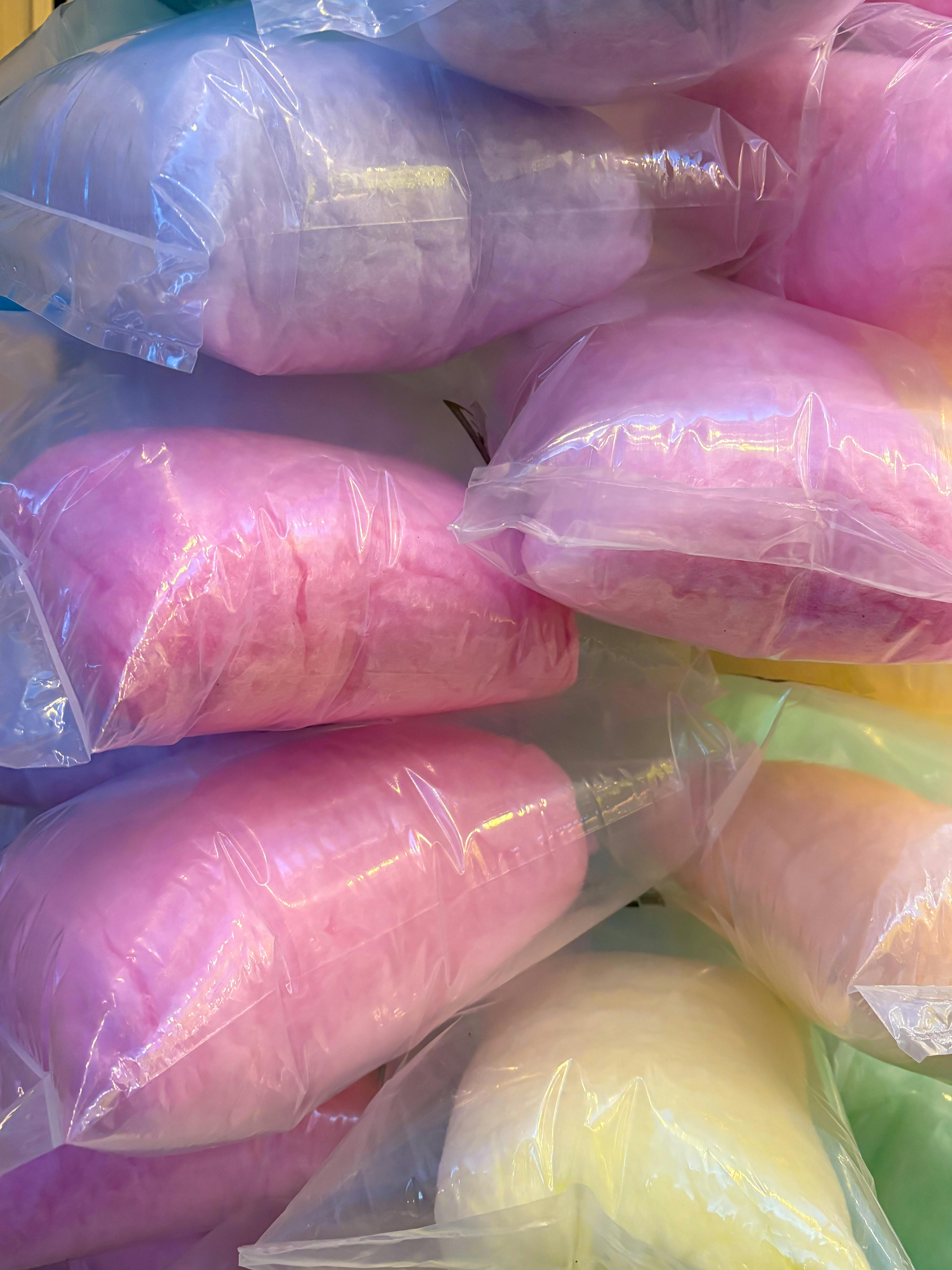 Colorful Cotton Candy Bags Stacked Up · Free Stock Photo