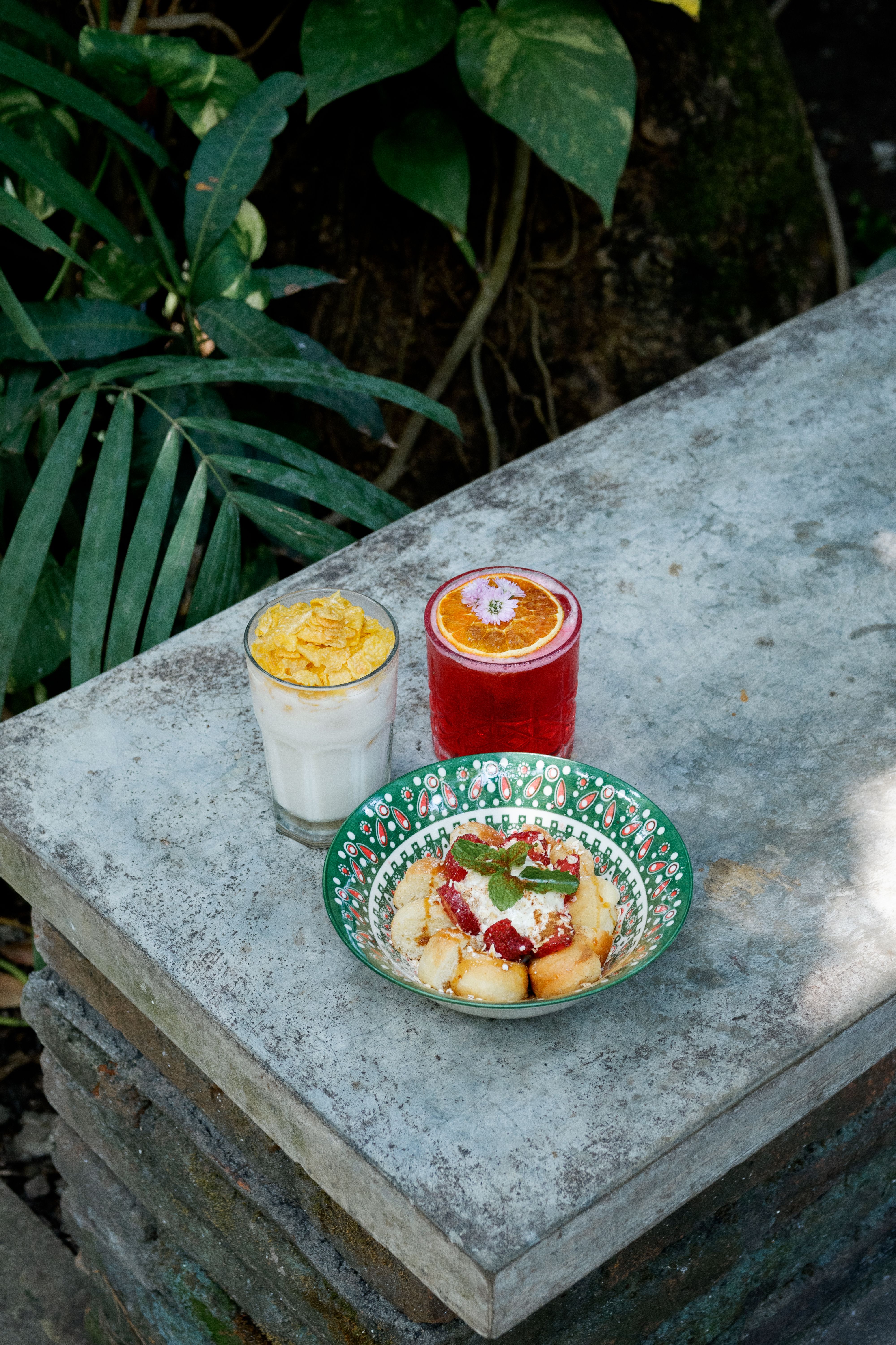 Colorful Tropical Breakfast on Rustic Stone Table · Free Stock Photo