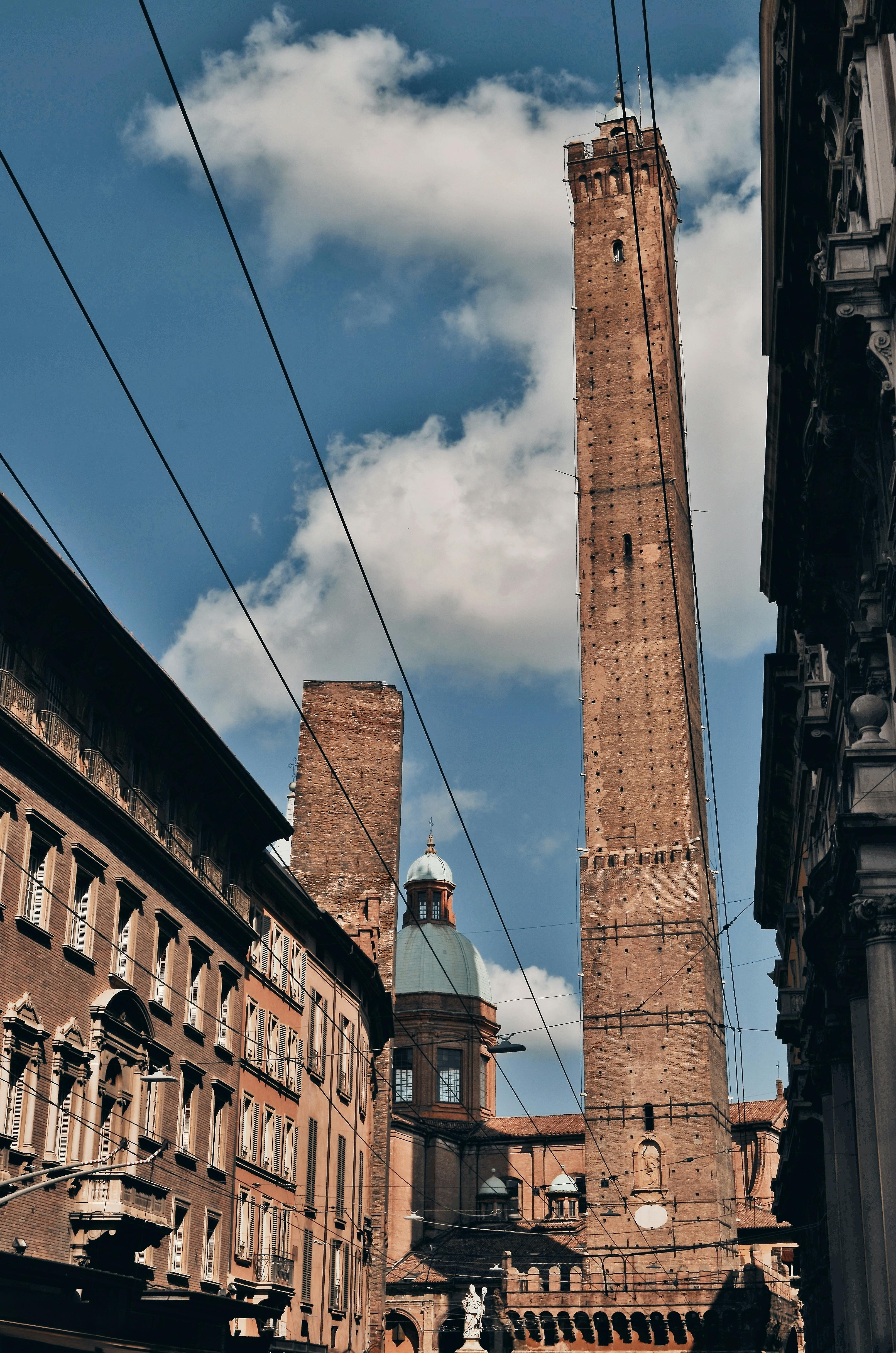 Historic Towers of Bologna under Blue Sky · Free Stock Photo