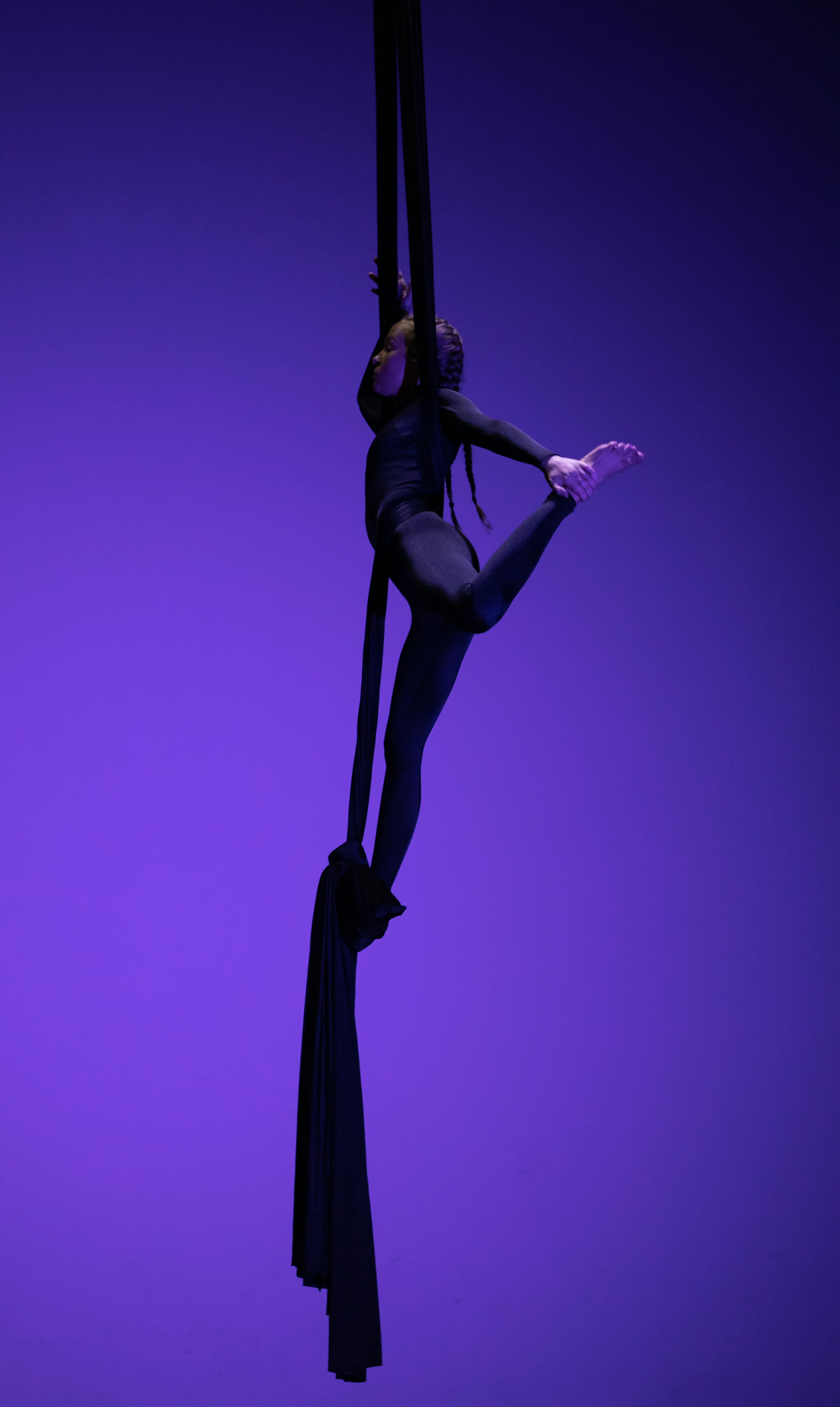 Circus Performer on Aerial Silks Performing Stunt · Free Stock Photo