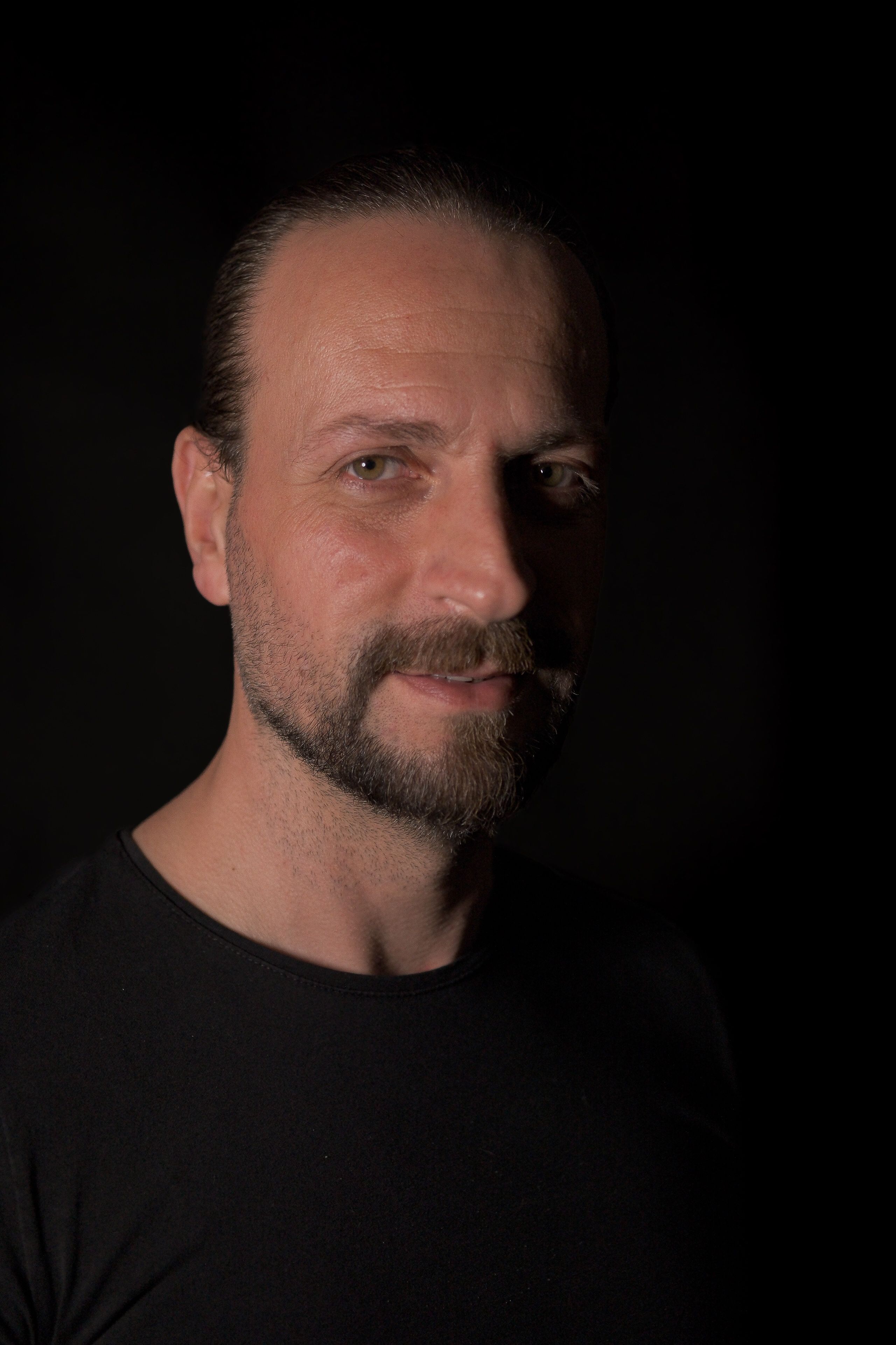 Moody Portrait of Man in Darkness · Free Stock Photo