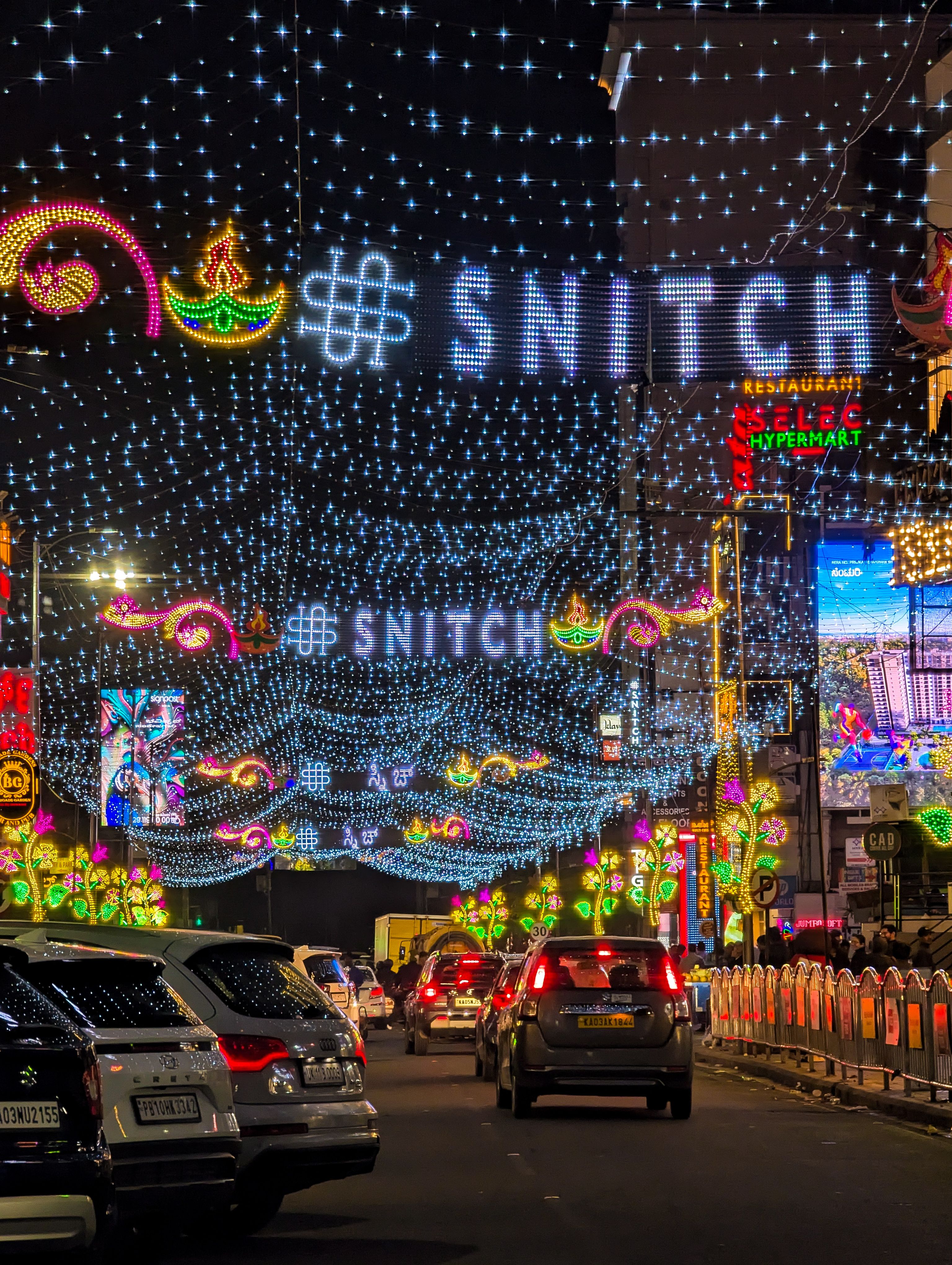 Vibrant Street Night with Festive Lights · Free Stock Photo